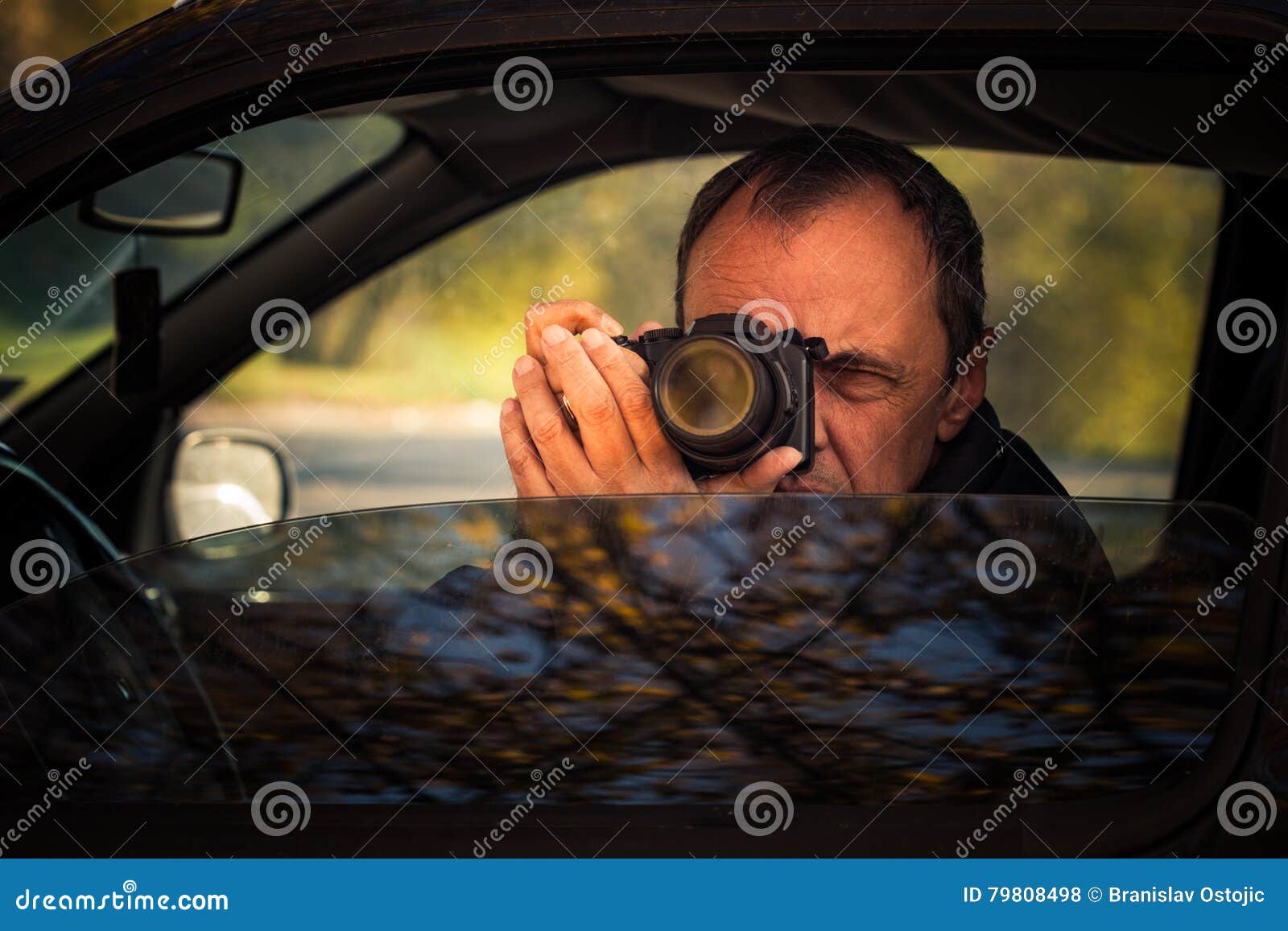 Undercover Man Hidden in Car Take Photo Stock Photo - Image of ... Undercover Man Hidden in Car Take Photo Stock Photo - Image of ...