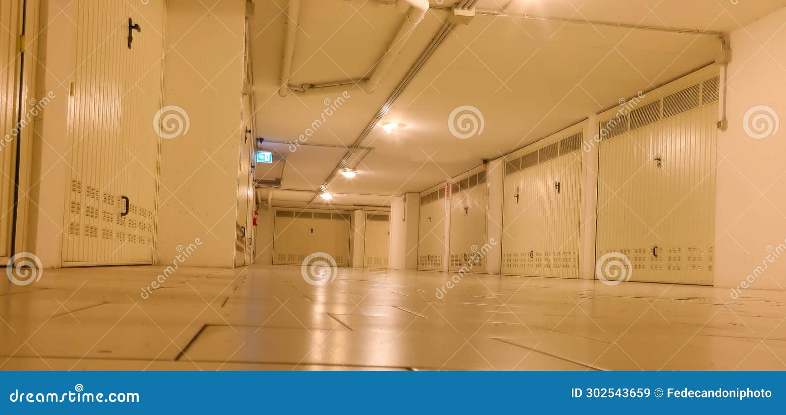 Underground Car Park with Garage Doors Under the Condominium Stock ...