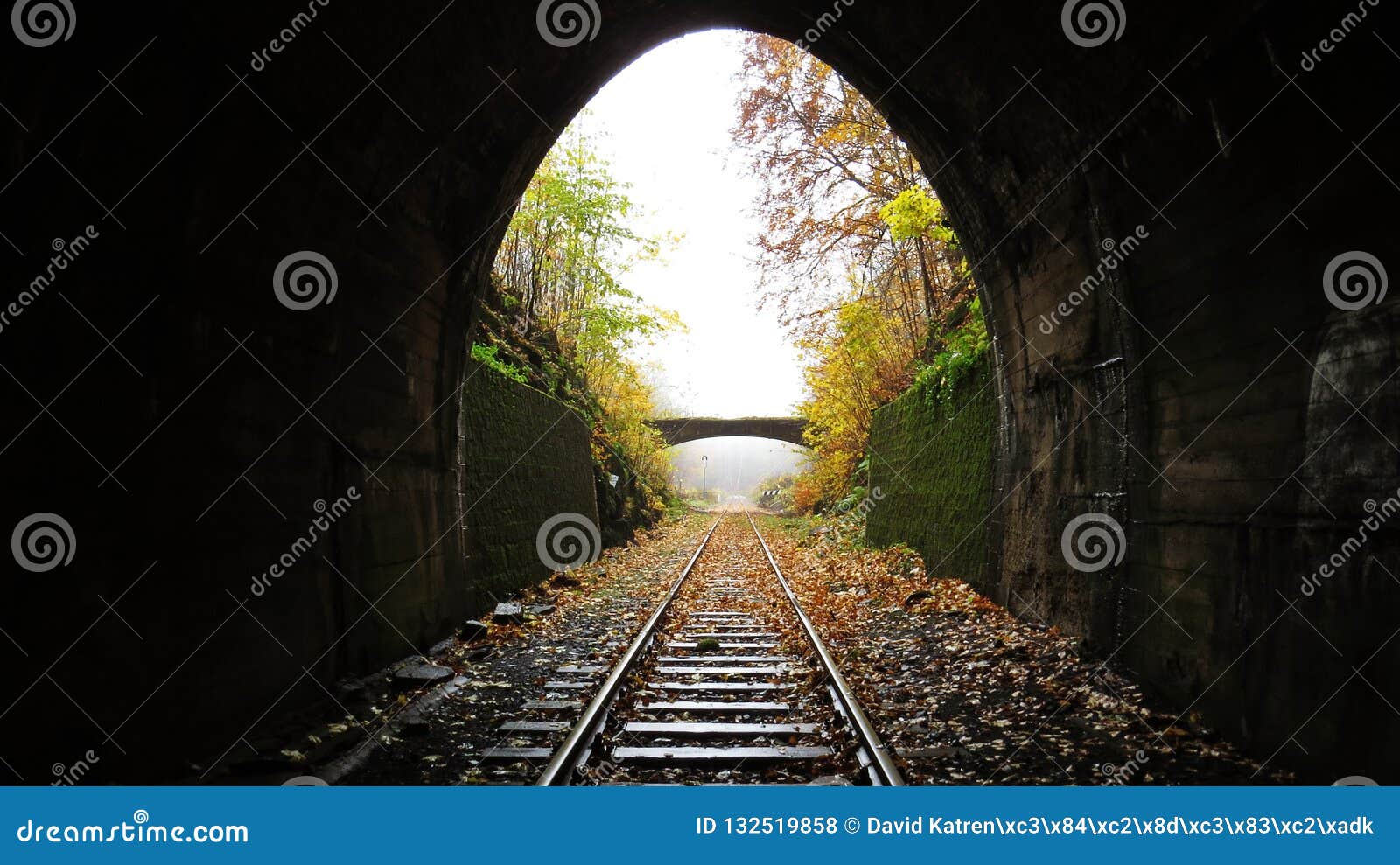 Underground Dark Train Rail Way Tunnel Exit with Light in the End Stock ...