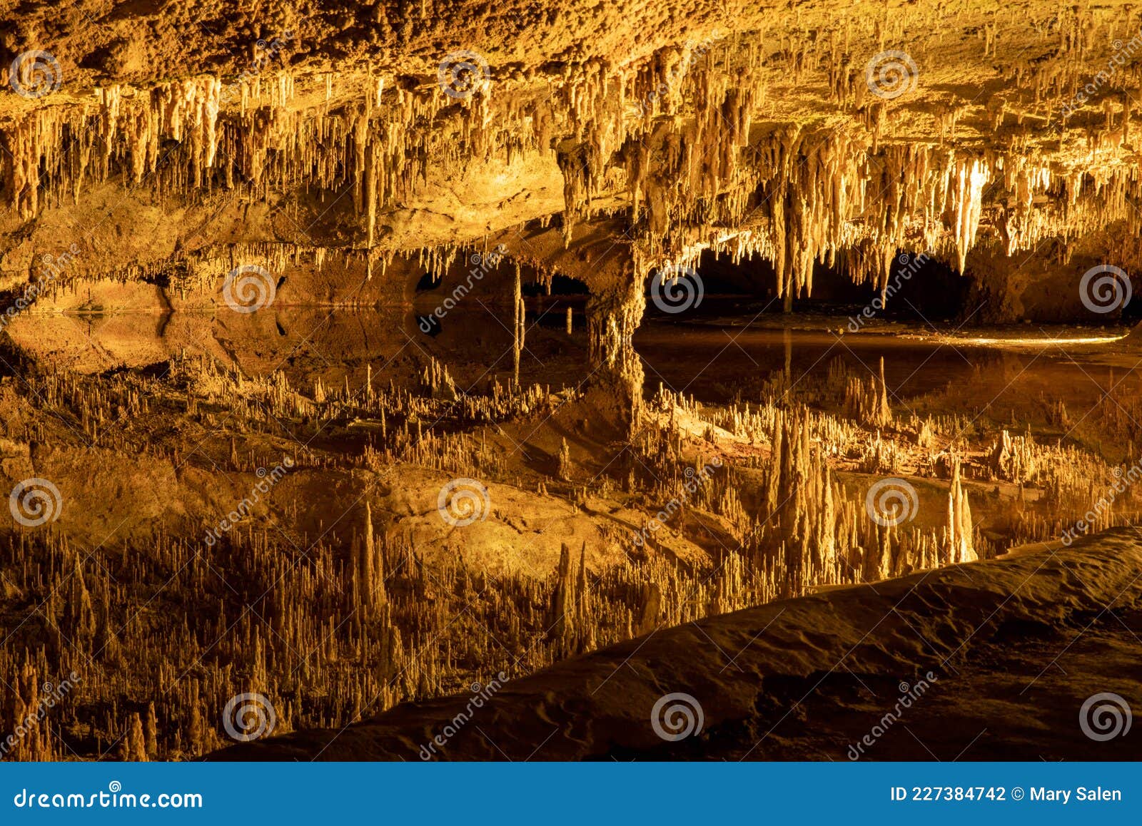 Underground Lake in Subterranean Cave Cavern Reflects Rock Formations ...