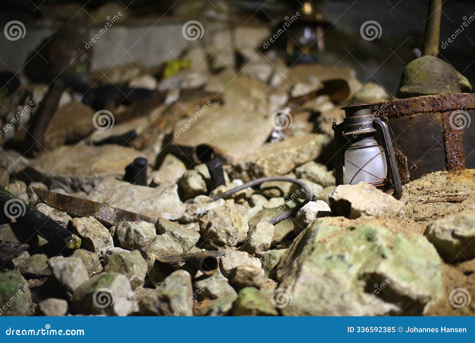 Underground Mine Scene with Scattered Tools and Lanterns among Rocks ...