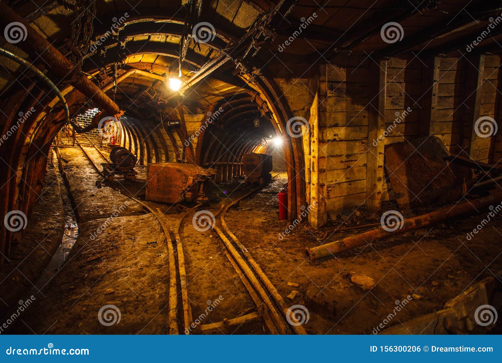 Underground Mining Tunnel with Rails. Stock Photo - Image of cave ...