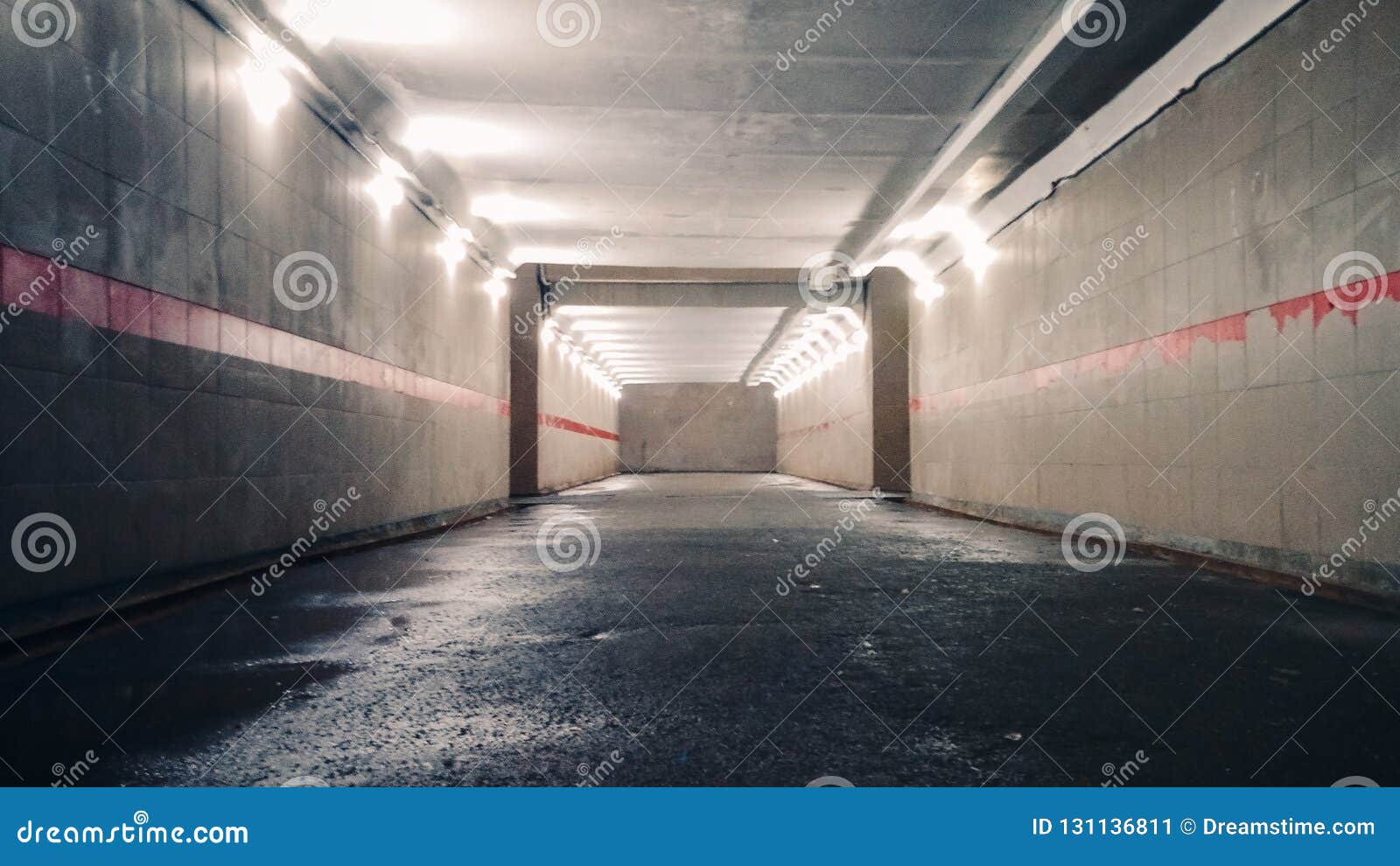 Underground Pedestrian Pathway with Lights on. Stock Image - Image of ...