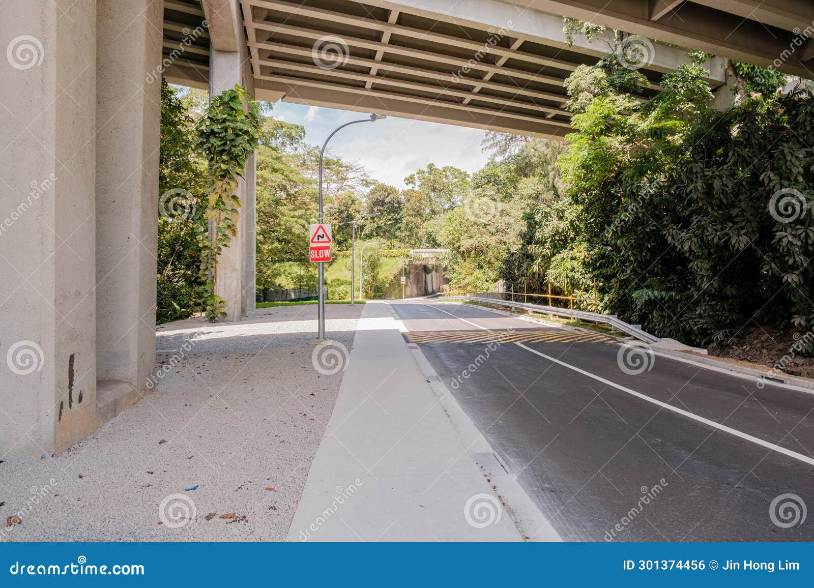 Underpass Bridge Road Slow Warning Stock Photo - Image of road ...