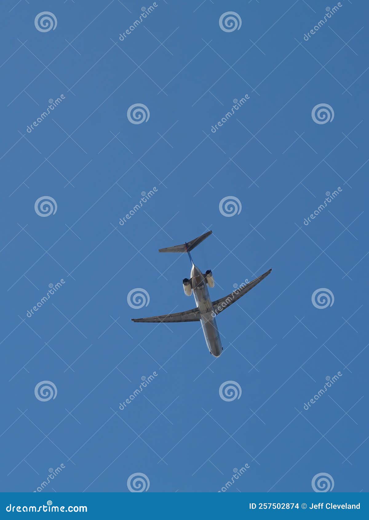 Underside of Commercial Aircraft in Clear Blue Sky Editorial Stock ...