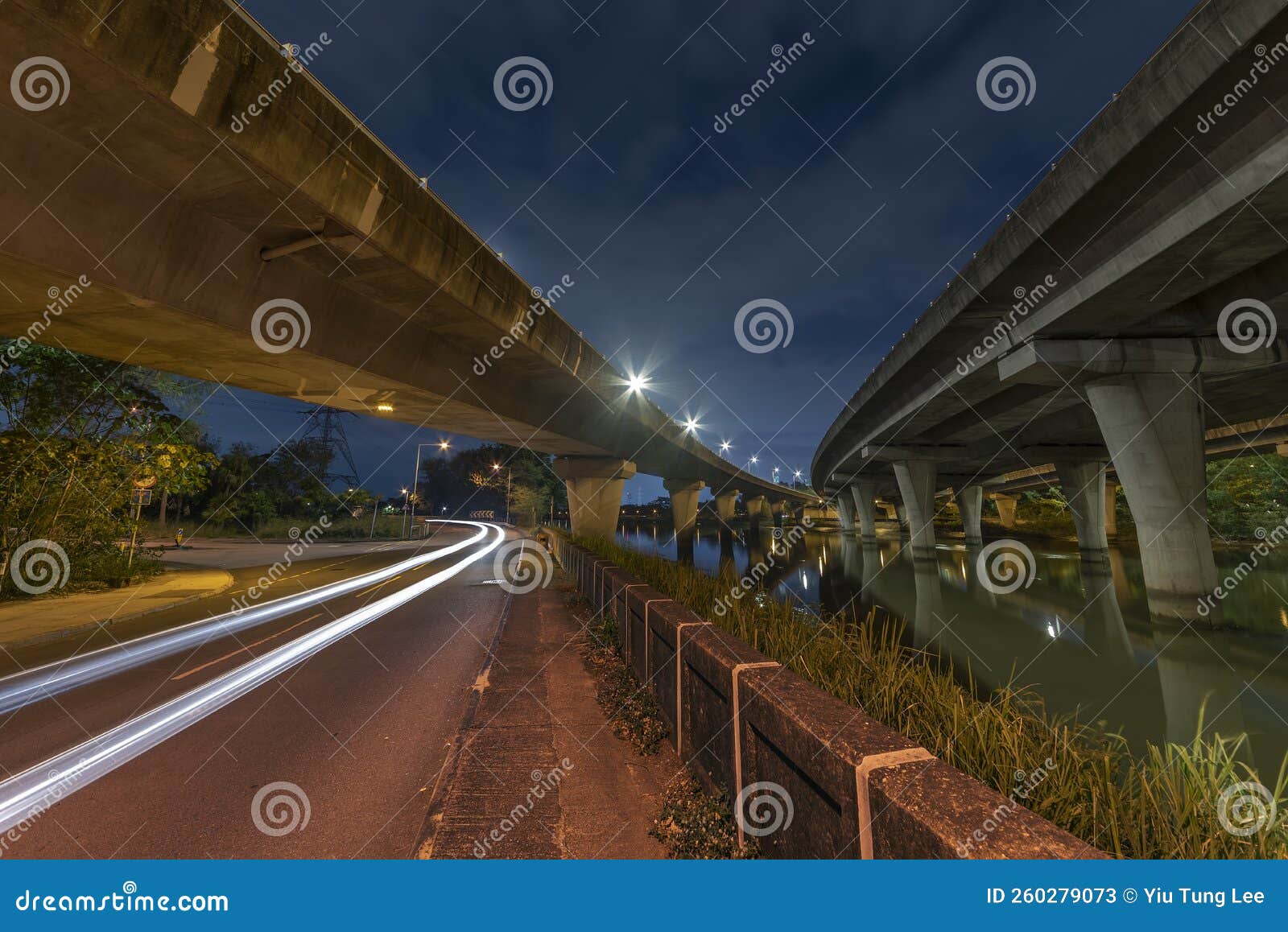 Underside of an Elevated Road Across River at Night Stock Image - Image ...