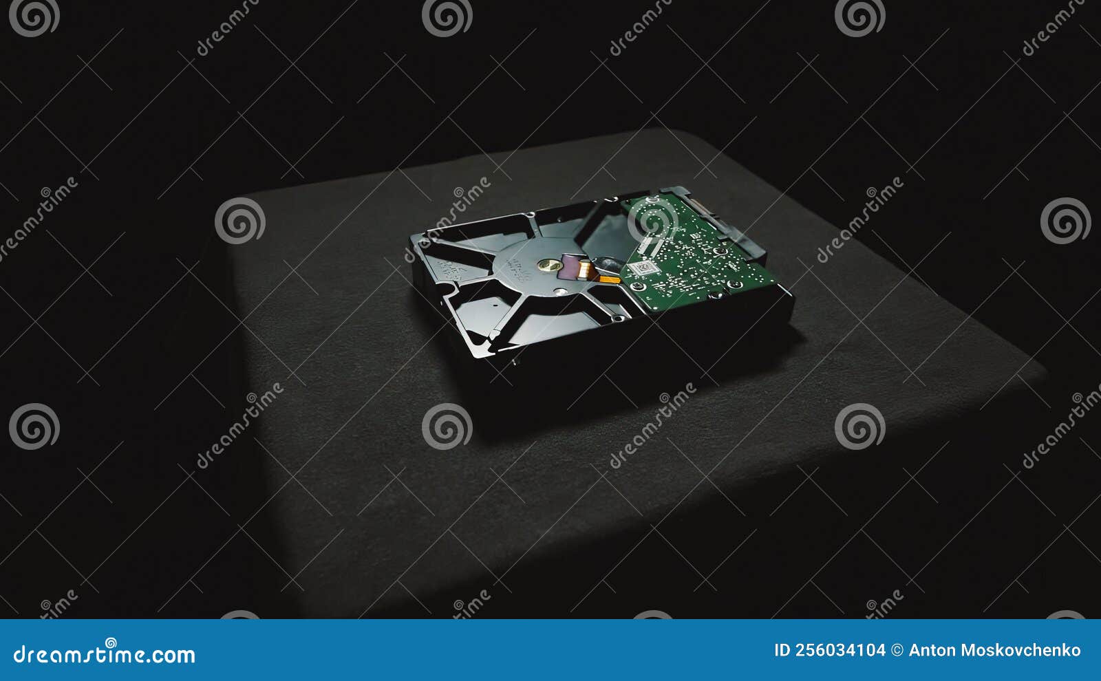 The Underside of an Hard Disk Drive in Dark Room on Textile Surface ...