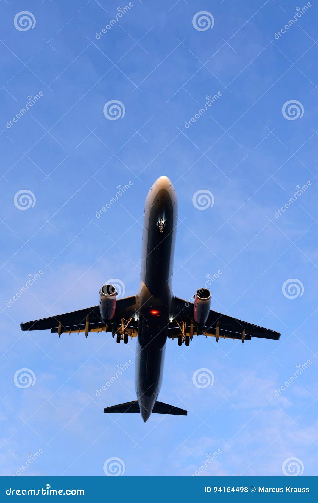 The Underside of a Modern Airplane Stock Photo - Image of flying ...