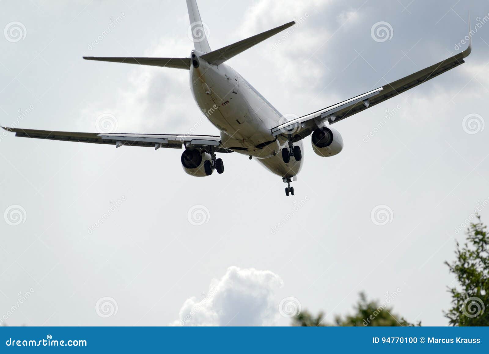 The Underside of a Modern Airplane Stock Photo - Image of land ...