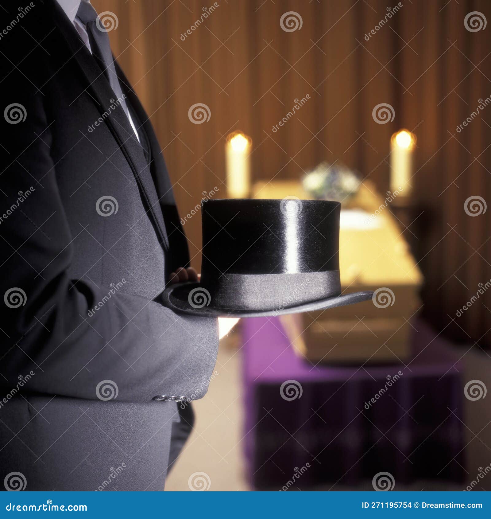 Undertaker Standing in Front of a Coffin with a Top Hat in His Hand ...