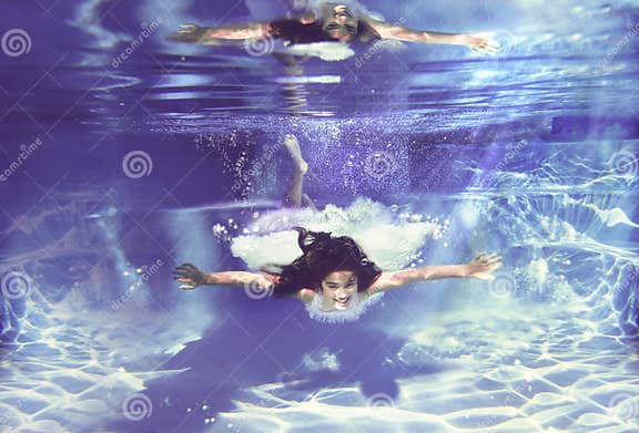 Underwater angel stock photo. Image of pool, beam, blue - 26351400