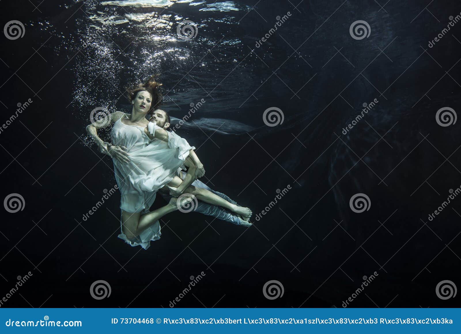 Underwater ballet dancers stock photo. Image of beauty - 73704468