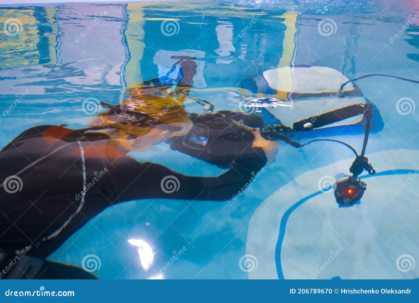 Underwater Camera. Diver Holds a Camera for Filming Underwater Stock ...