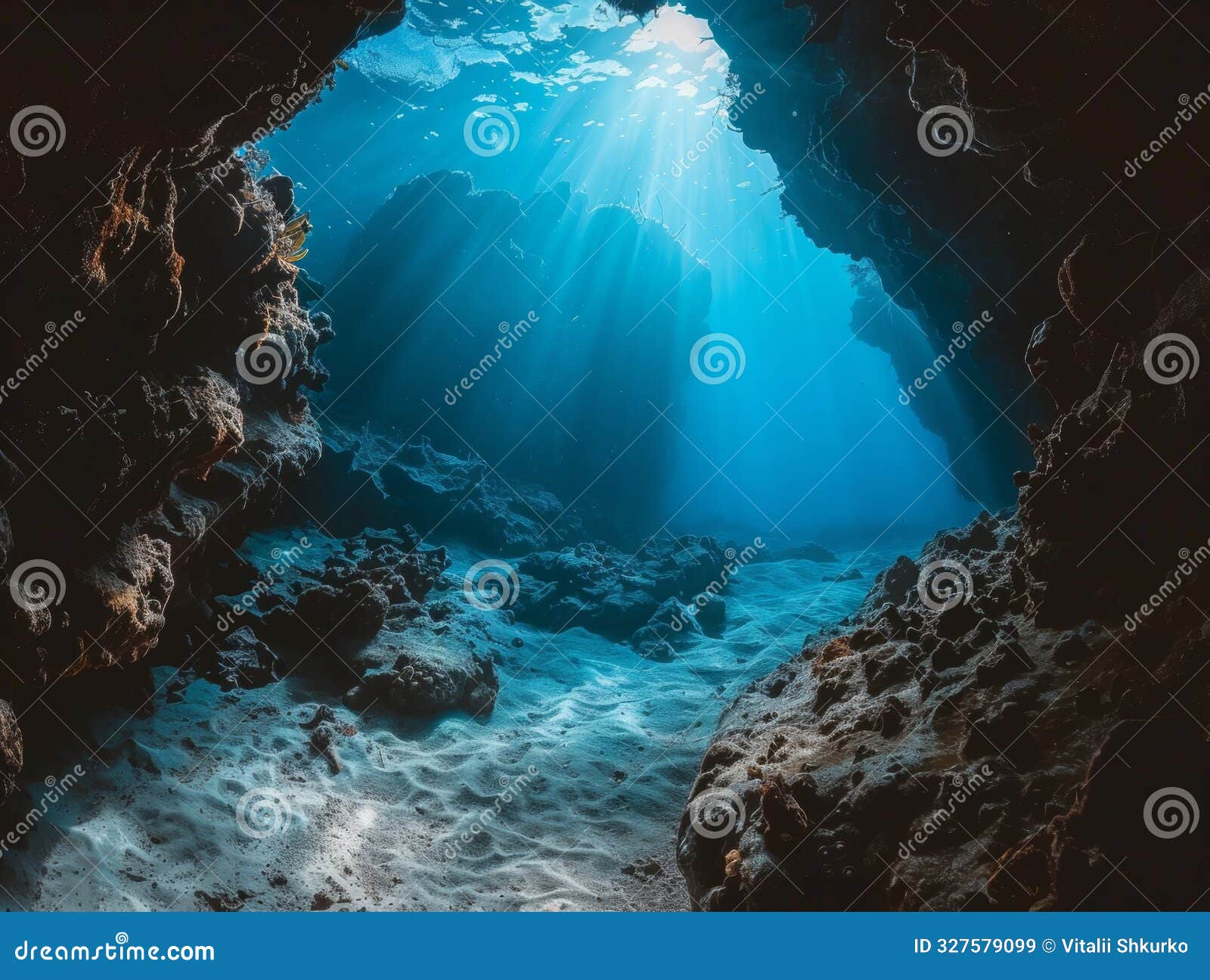 An Underwater Cave with Sun Rays Filtering through the Water ...
