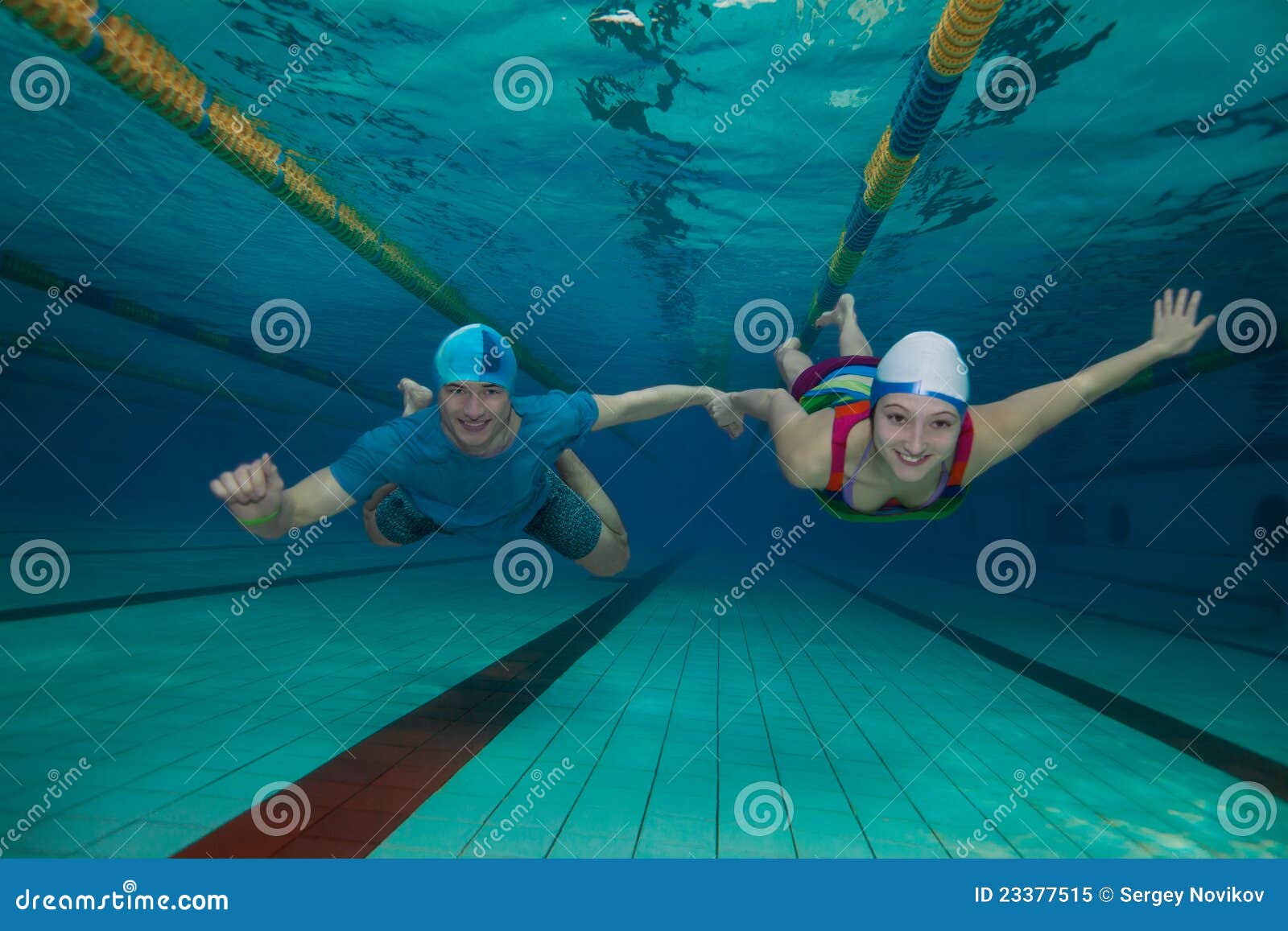Underwater fun - couple stock image. Image of friends - 23377515