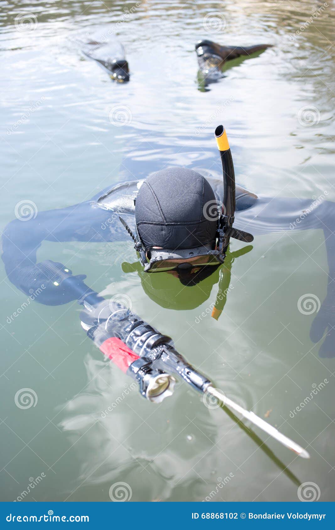 Underwater hunter. stock photo. Image of labored, success - 68868102