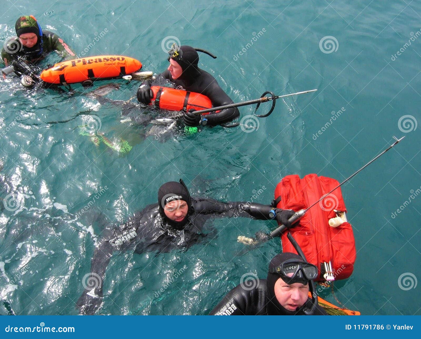 Underwater Hunters in the Sea Editorial Photo - Image of group, black ...