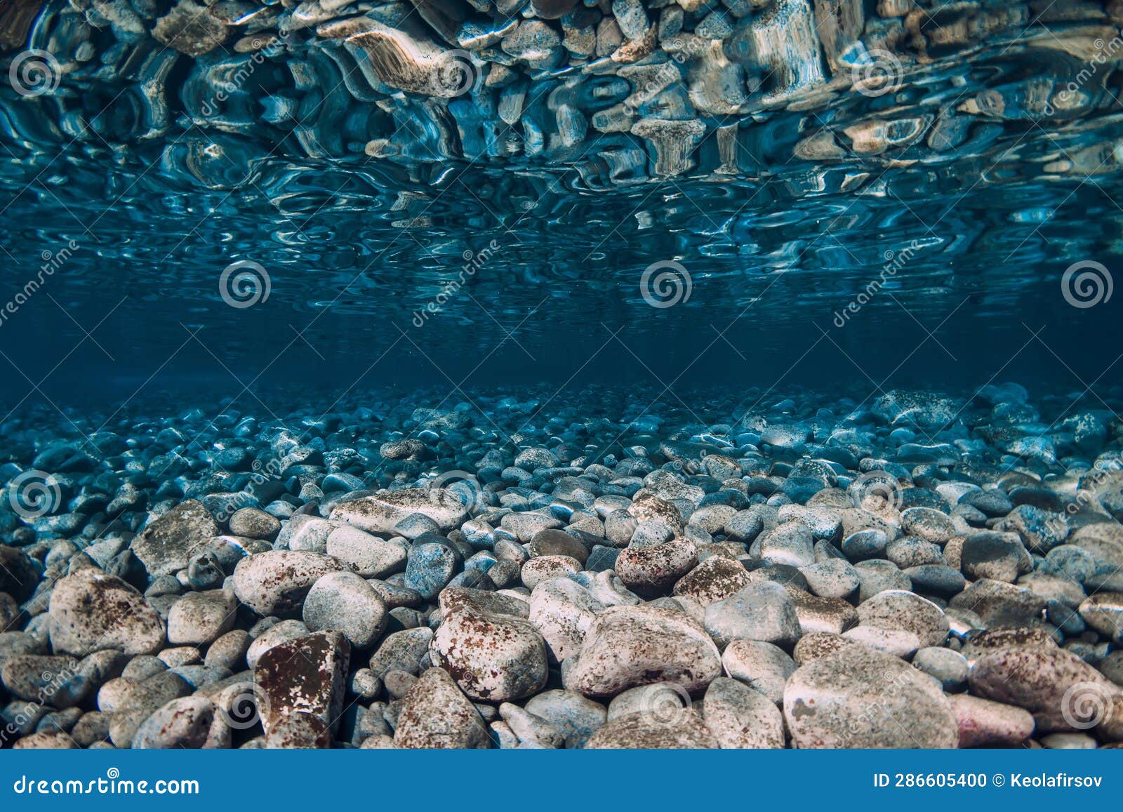 Underwater Ocean with Stone Bottom and Reflection on Surface Stock ...