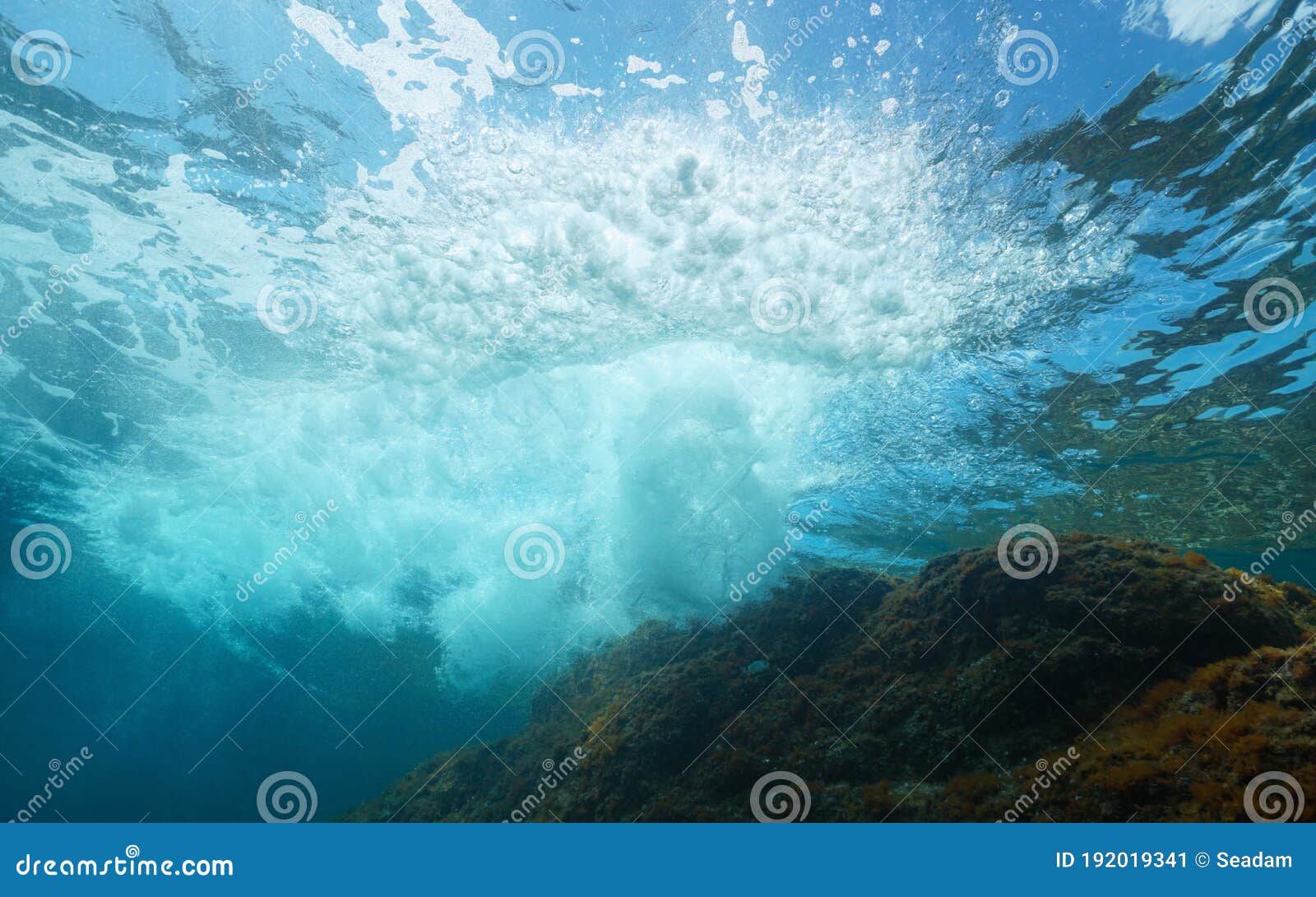 Underwater Sea Wave Breaking on Rock Below Surface Stock Image - Image ...