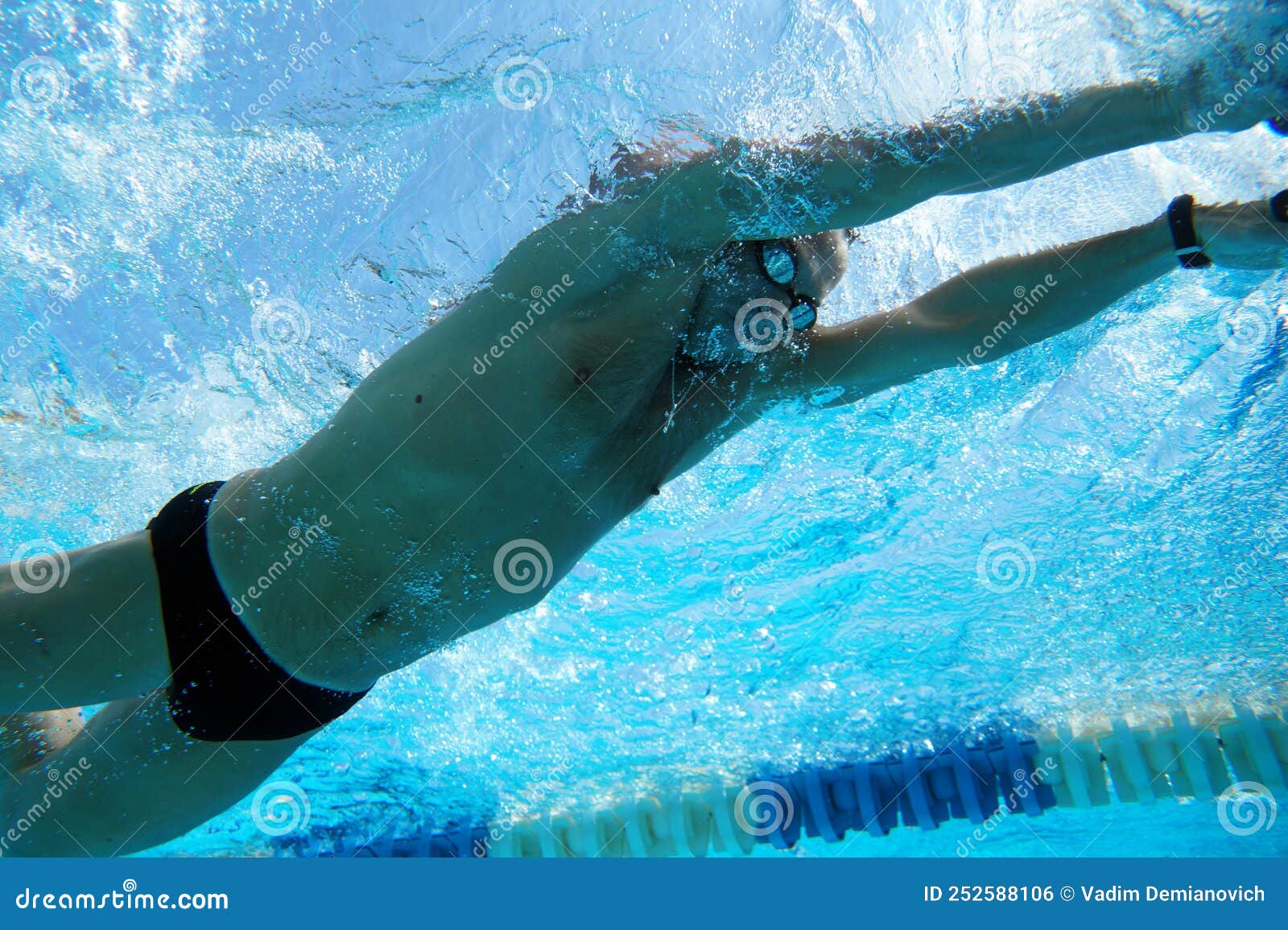 Underwater Shooting of a Swimmer in a Swimming Pool Stock Photo - Image ...