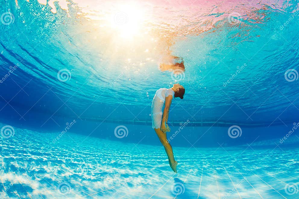 Underwater Swimming and Reflection in Water Stock Image - Image of blue ...