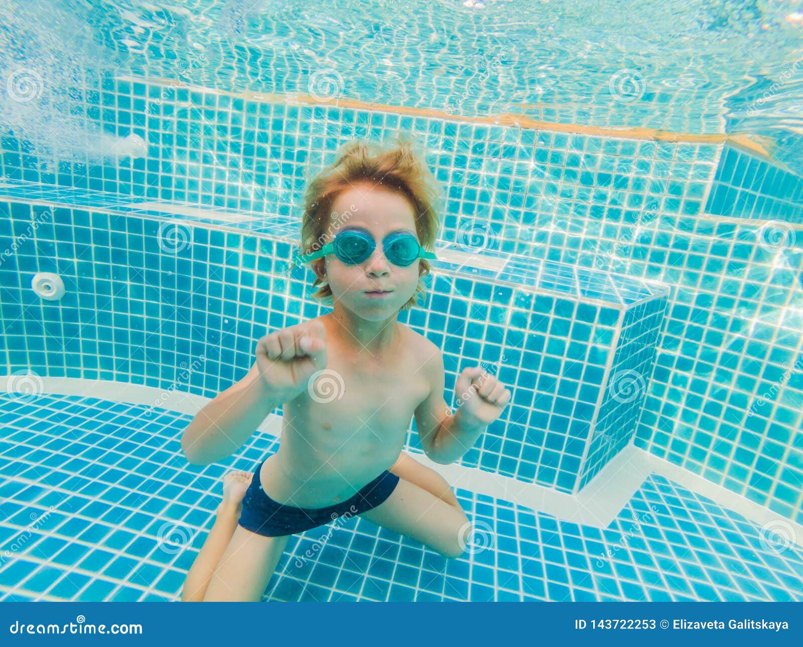 Underwater Young Boy Fun in the Swimming Pool with Goggles. Summer ...