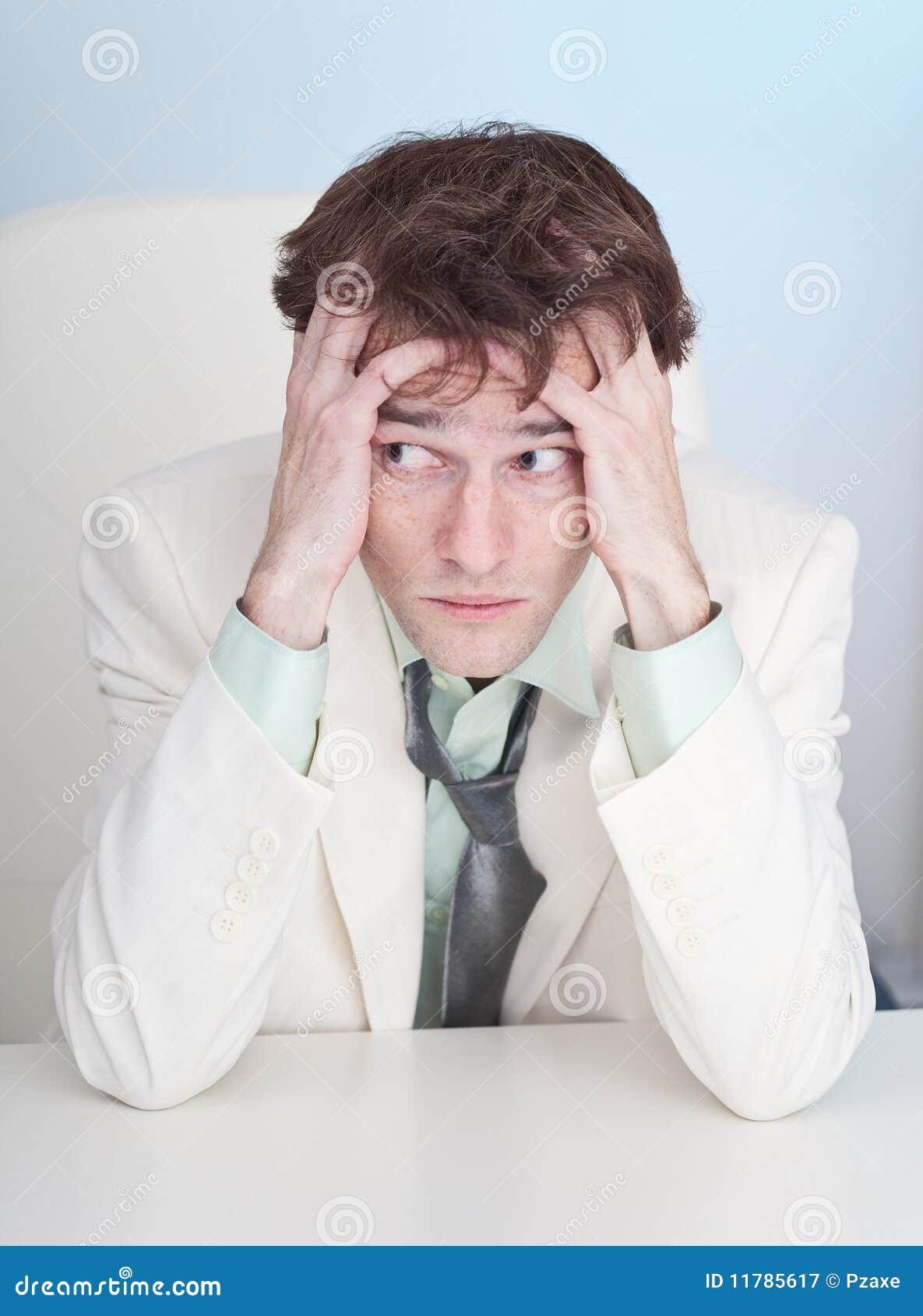 Uneasy Businessman Sits at a Table Stock Image - Image of grieved ...
