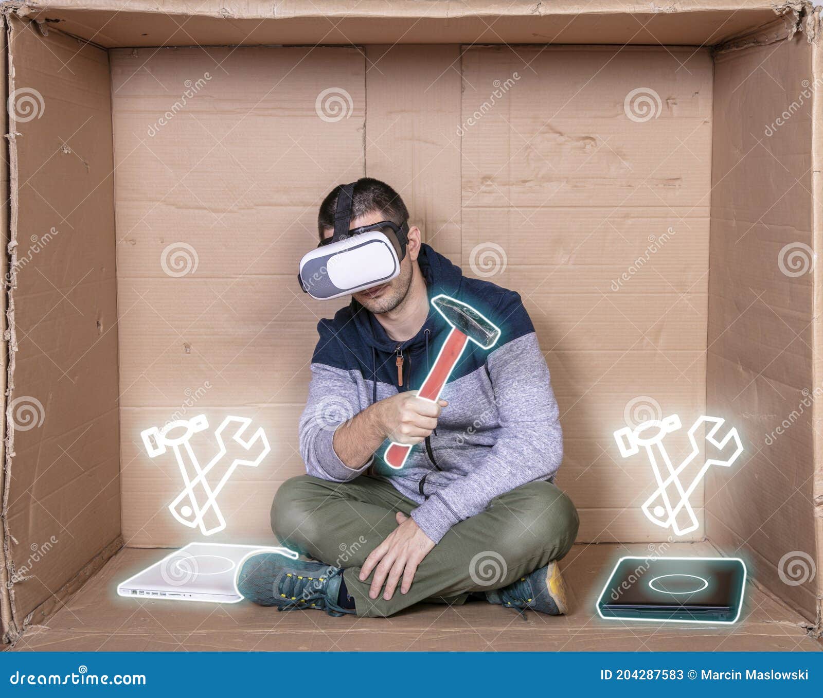 Unemployed Boy Wearing VR Glasses with a Hammer in His Hand Stock Image ...