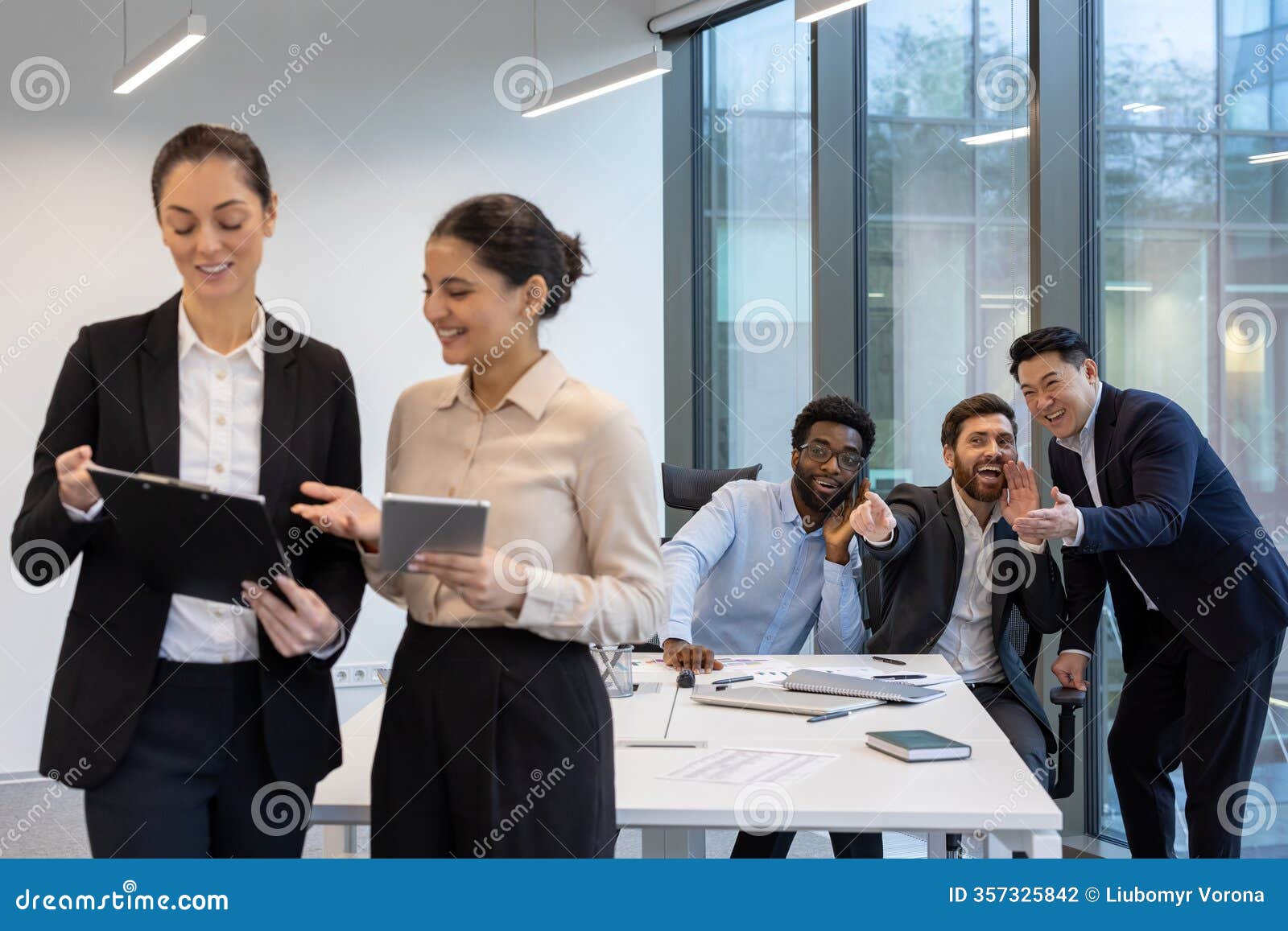 Unethical Behavior, Harassment. Men Mocking Female Colleagues Inside ...
