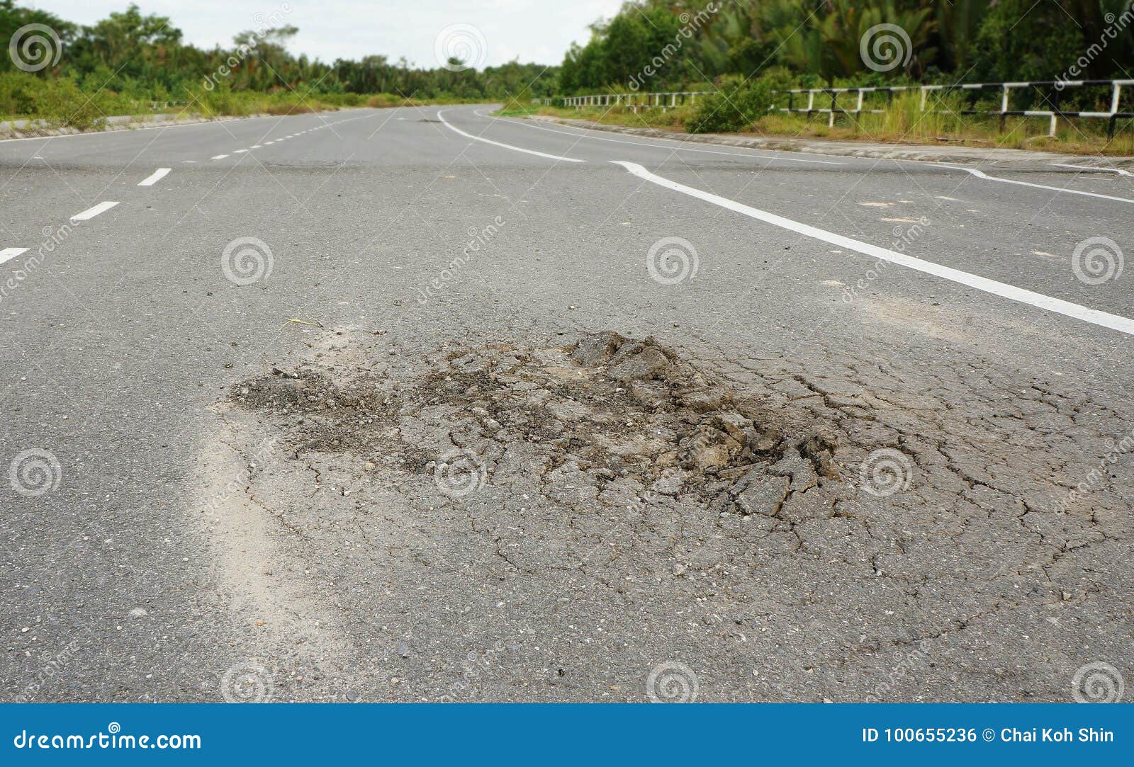 Cracked and Damaged Asphalt Concrete Road Stock Photo - Image of ...