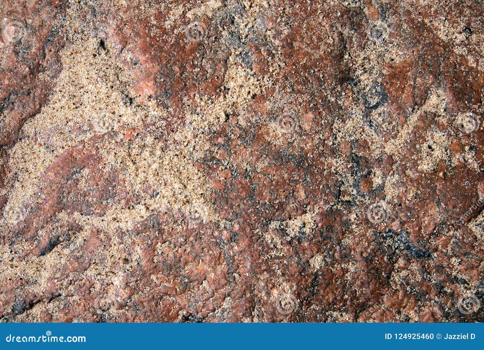 Uneven Surface of Pink Granite Boulder Partially Covered with Sand ...