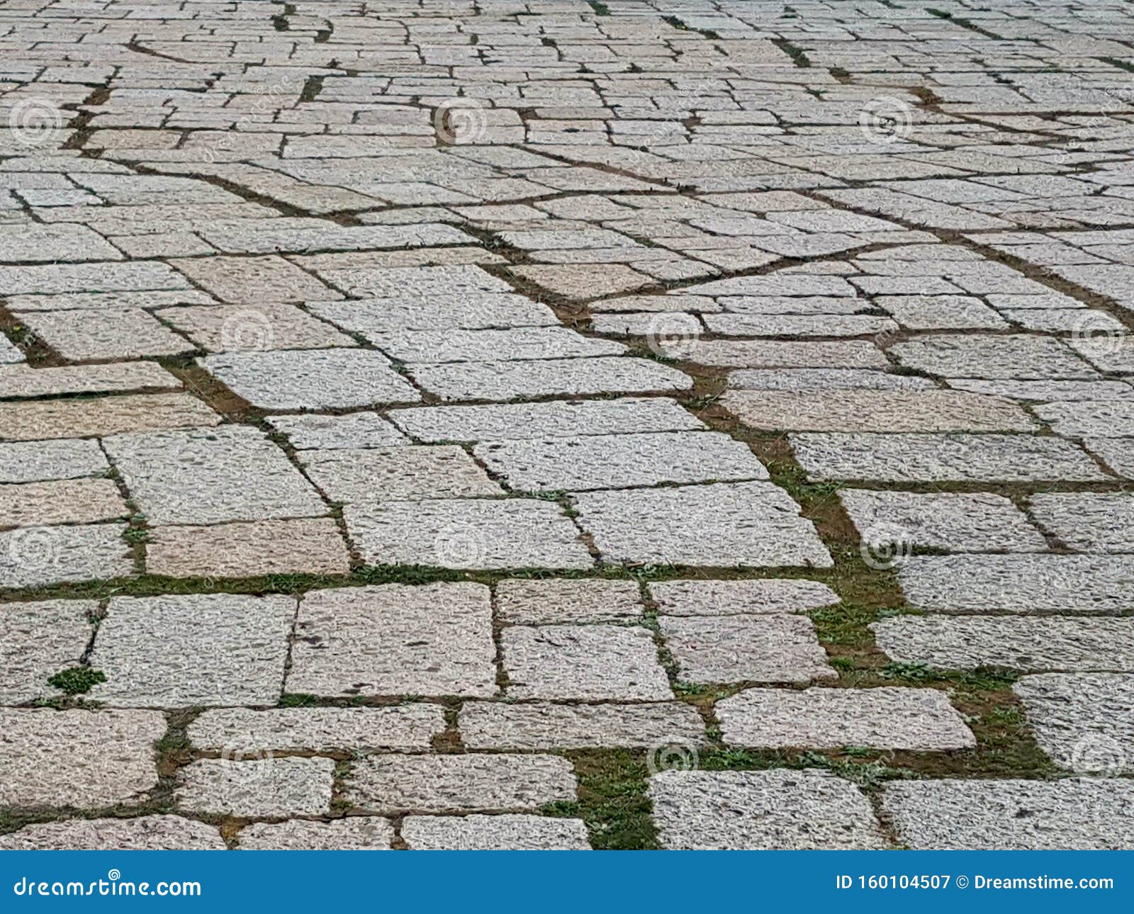 Unevenly laid stone tiles stock image. Image of park - 160104507