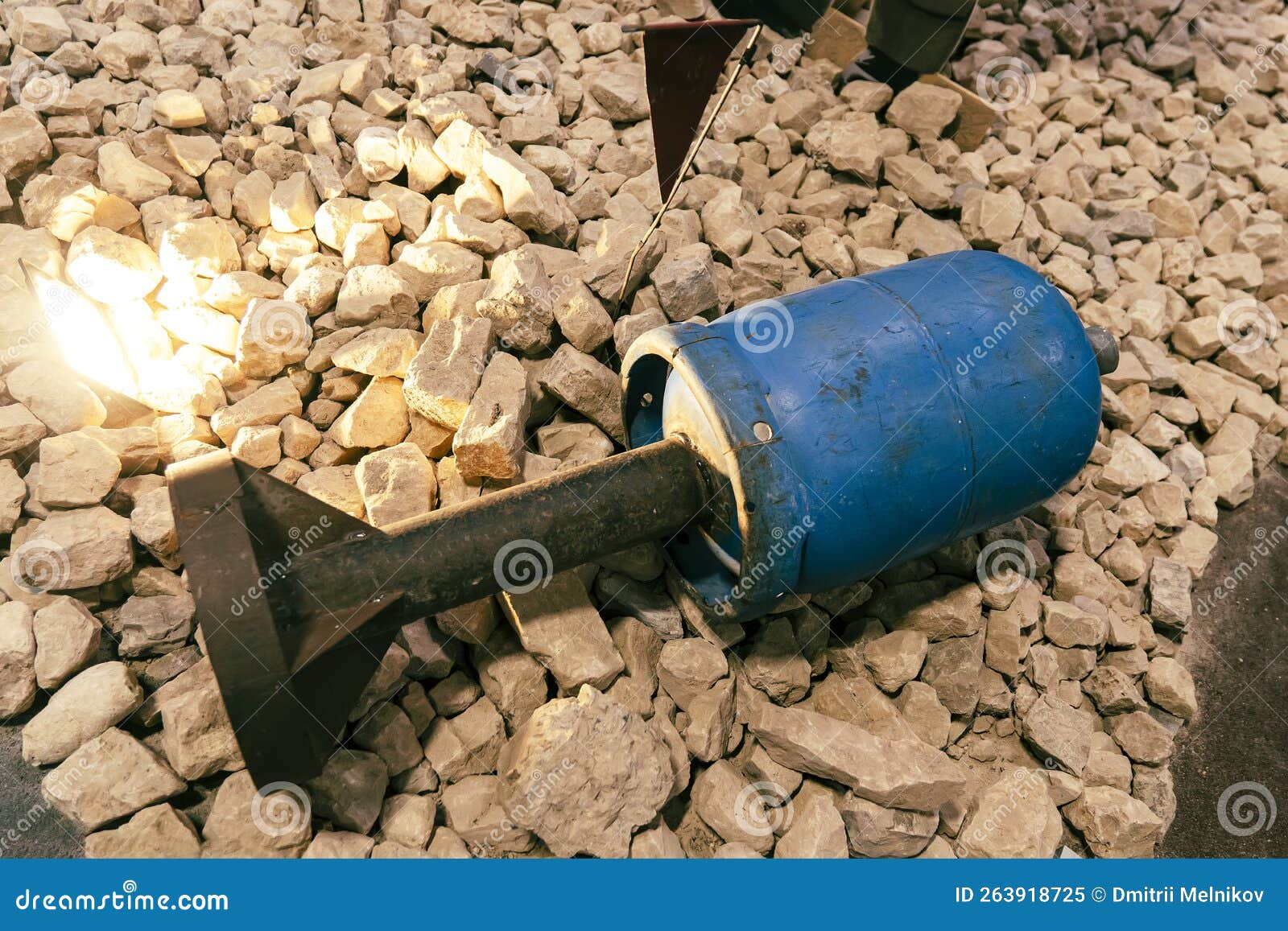 An Unexploded Mortar Mine Lying on the Rocks. Clearance of Unexploded ...