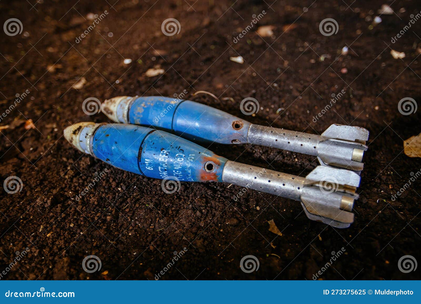 Unexploded Mortar Mines on Ground. War Actions Aftermath Stock Image ...