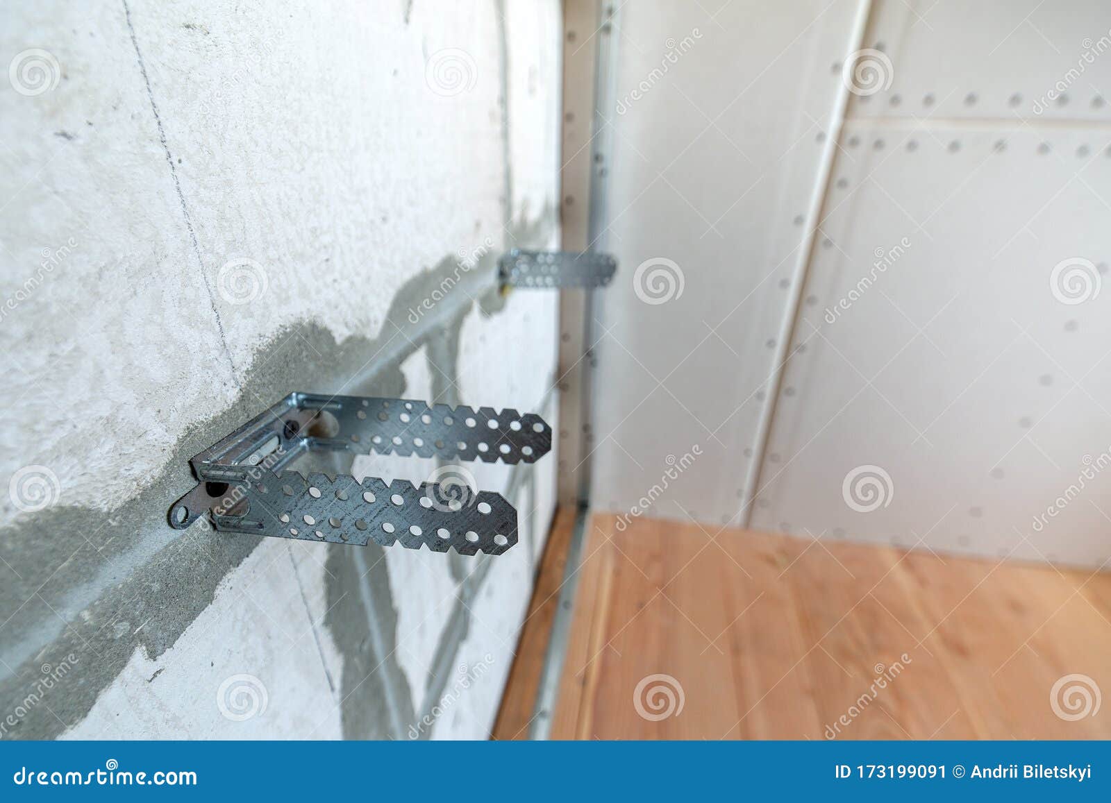 Unfinished Brick Wall in a Room Under Construction Prepared for Drywall ...
