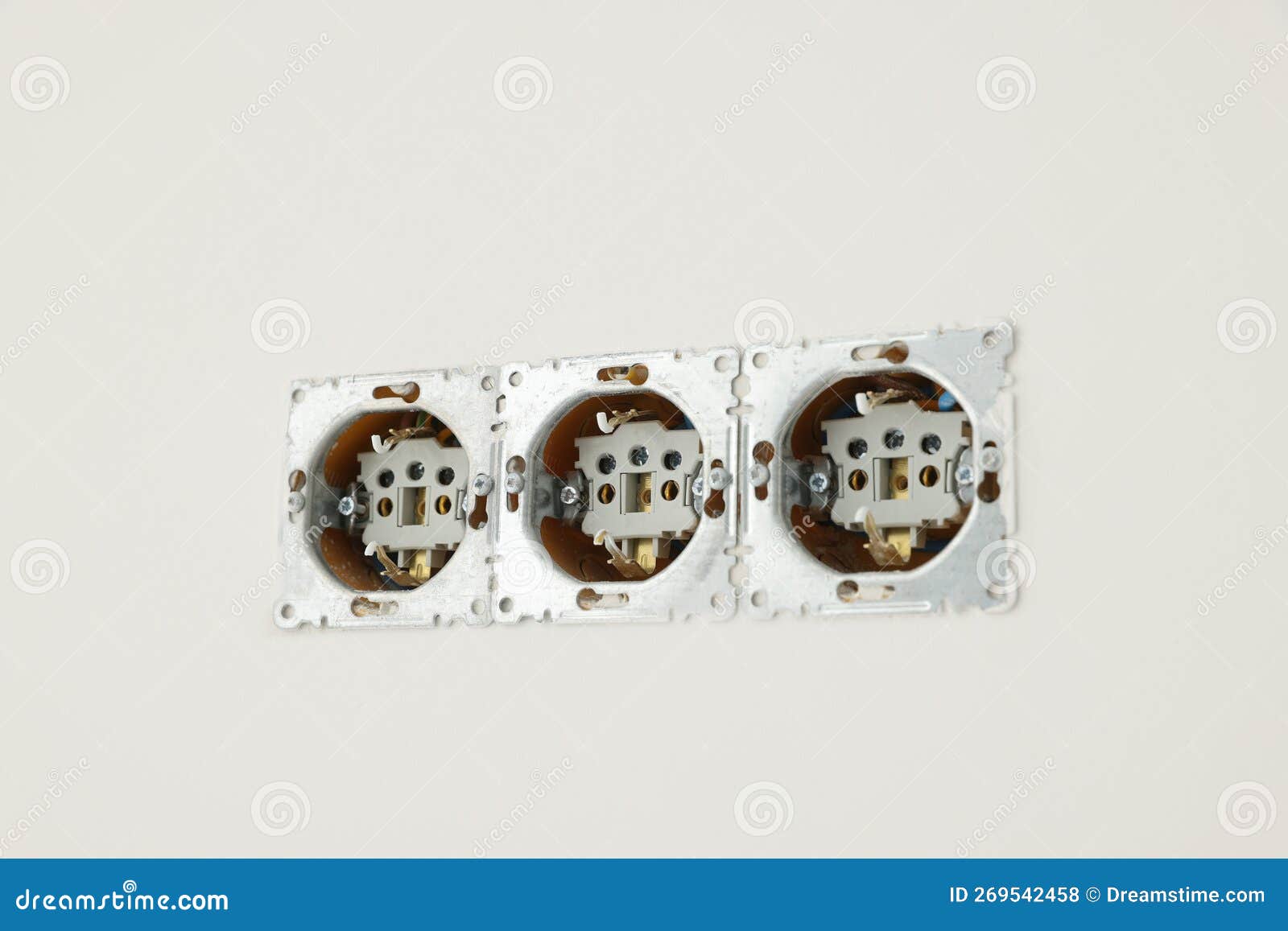 Unfinished Electric Power Sockets on White Wall Stock Photo - Image of ...