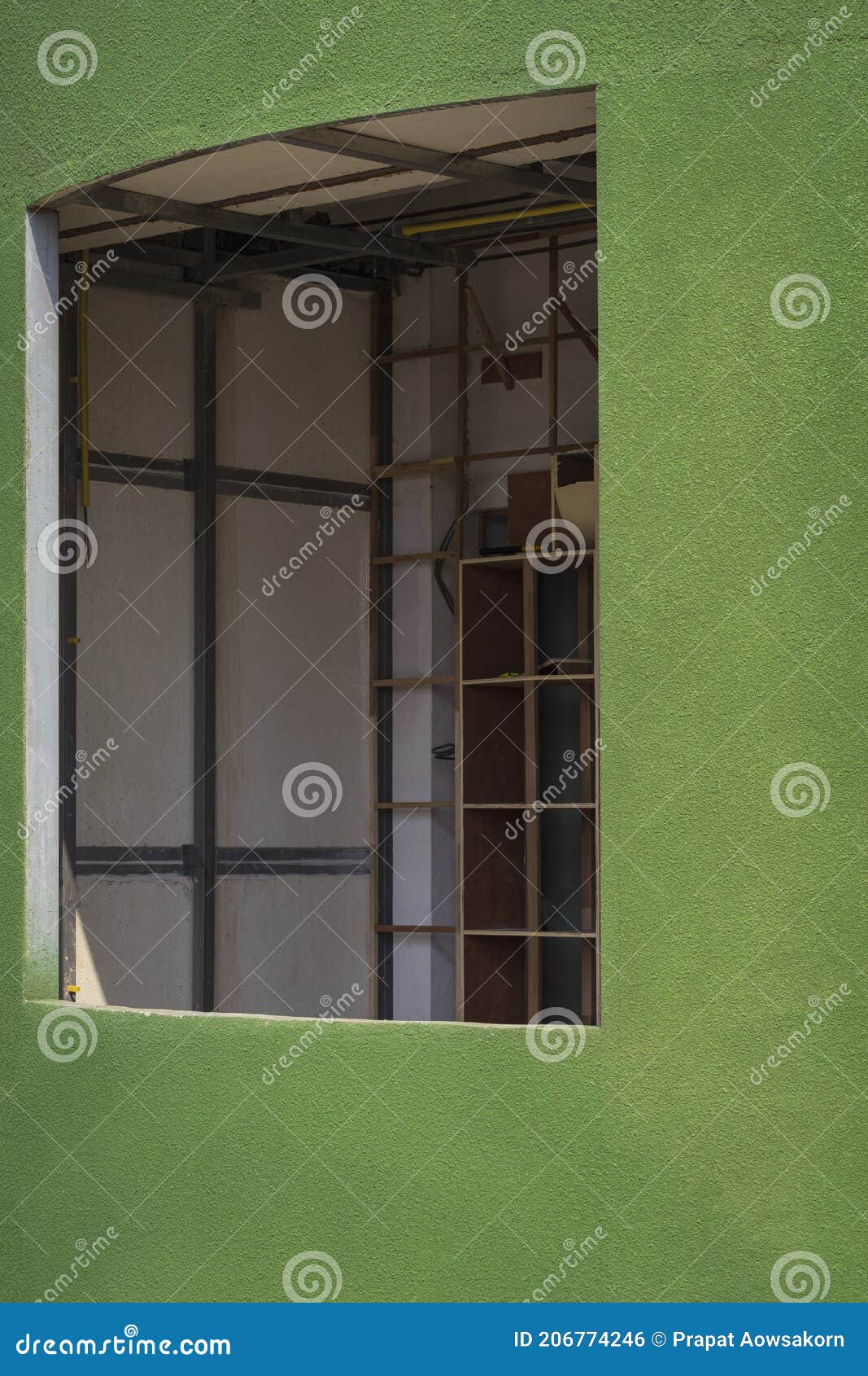 The Unfinished Interior Wall in Window Frames on Curve Green Concrete ...