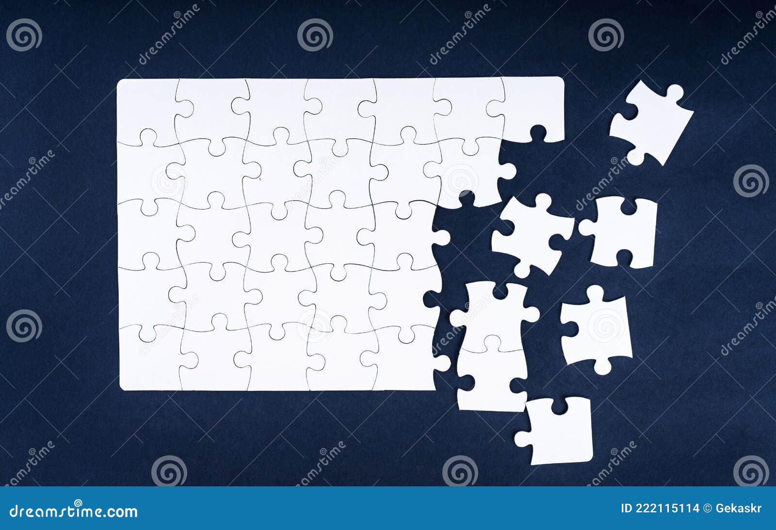 Unfinished jigsaw puzzle stock photo. Image of printing - 222115114
