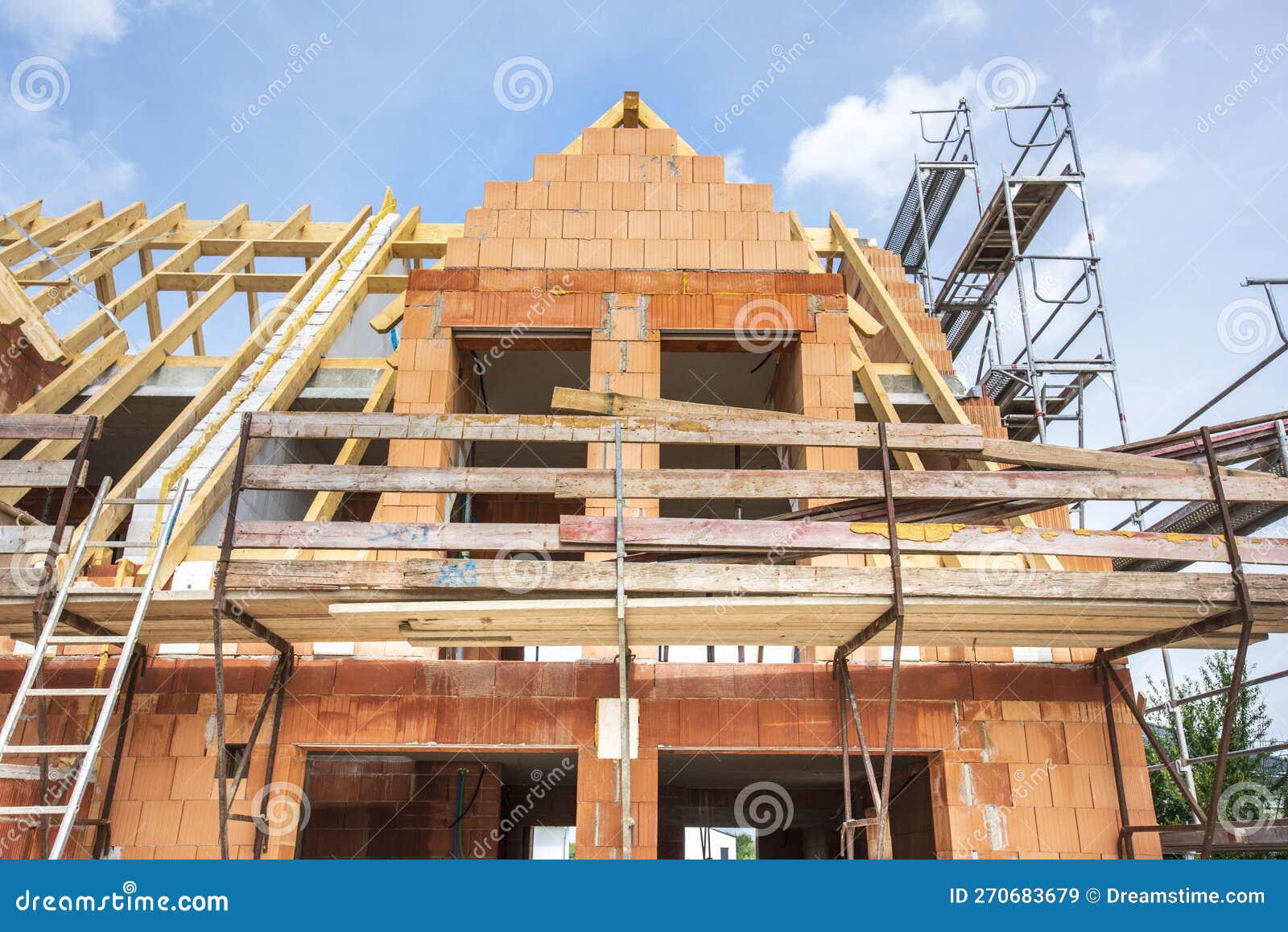 New Unfinished Residential Home Under Construction With Framing Made Of ...