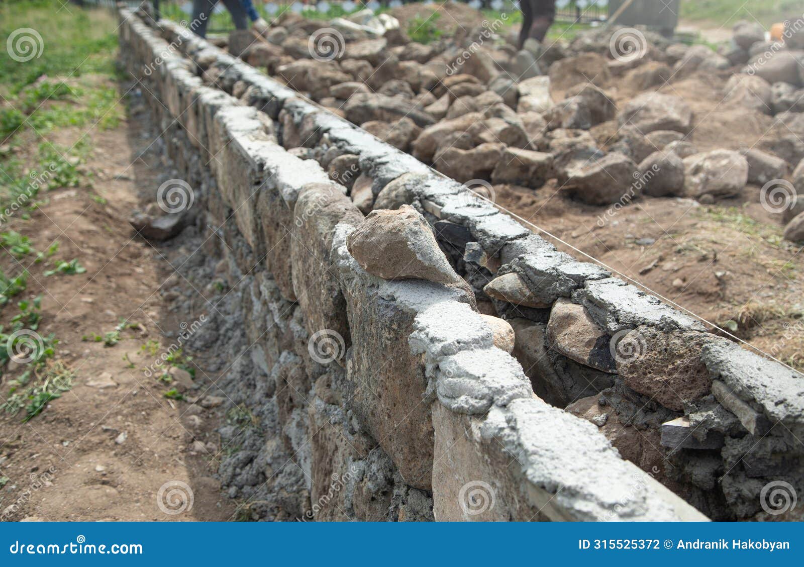 Unfinished Rough Stone Wall in Outdoor. Construction Stock Photo ...