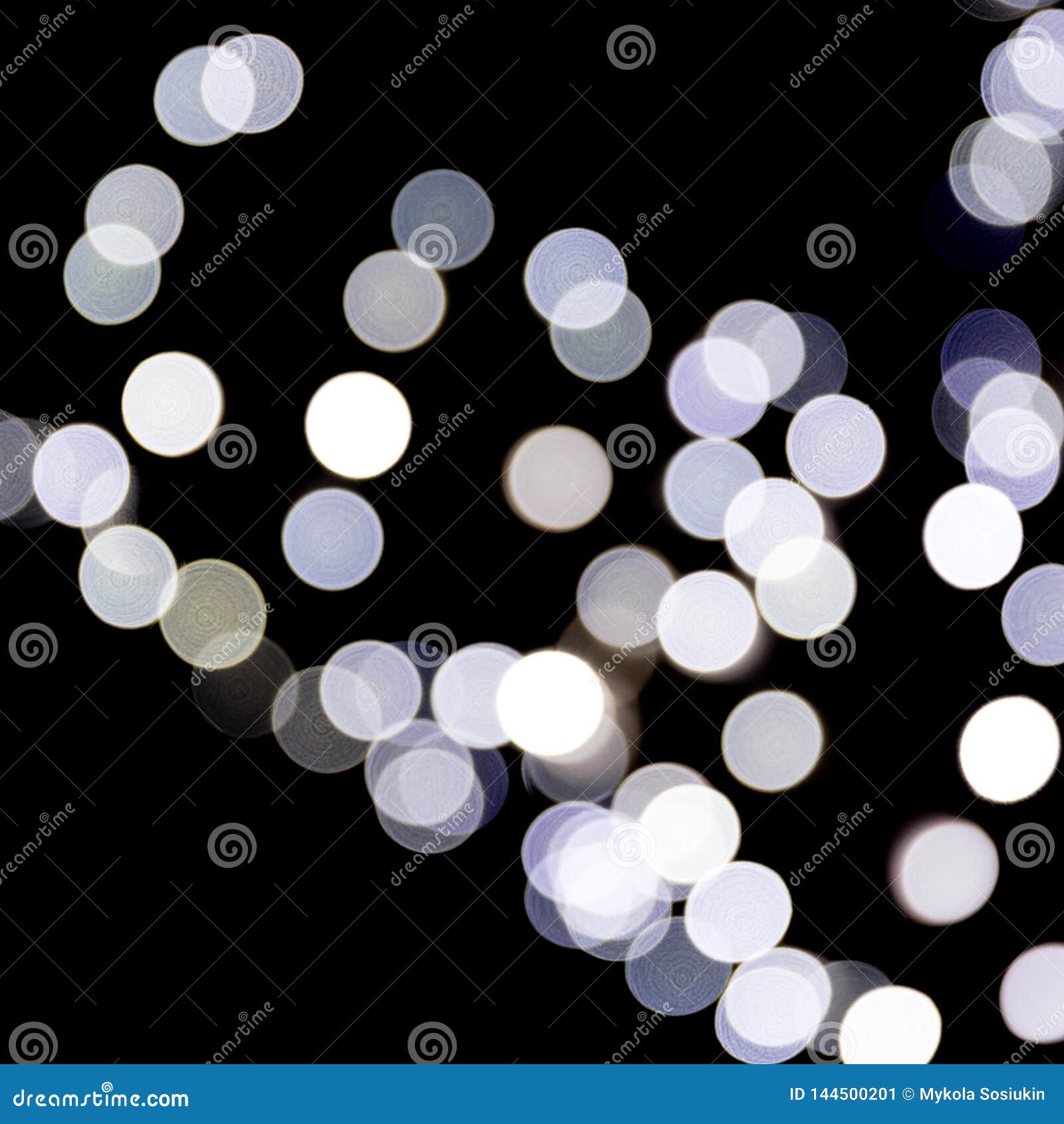 Unfocused Abstract White Bokeh on Black Background. Defocused and ...