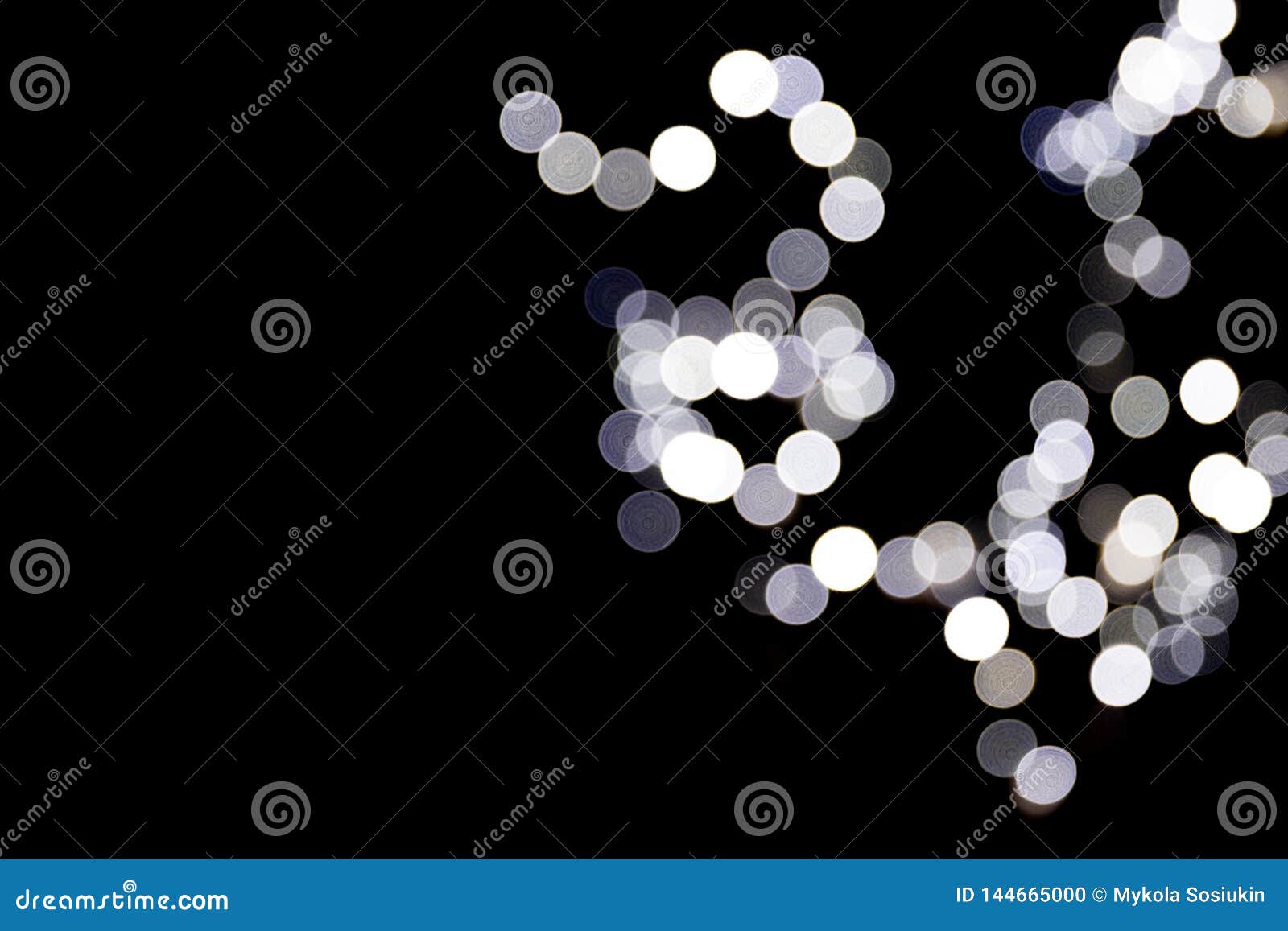 Unfocused Abstract White Bokeh on Black Background. Defocused and ...