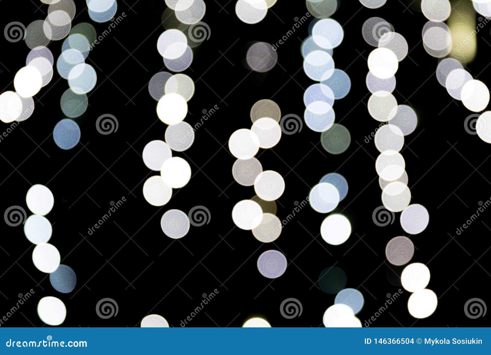 Unfocused Abstract White Bokeh on Black Background. Defocused and ...
