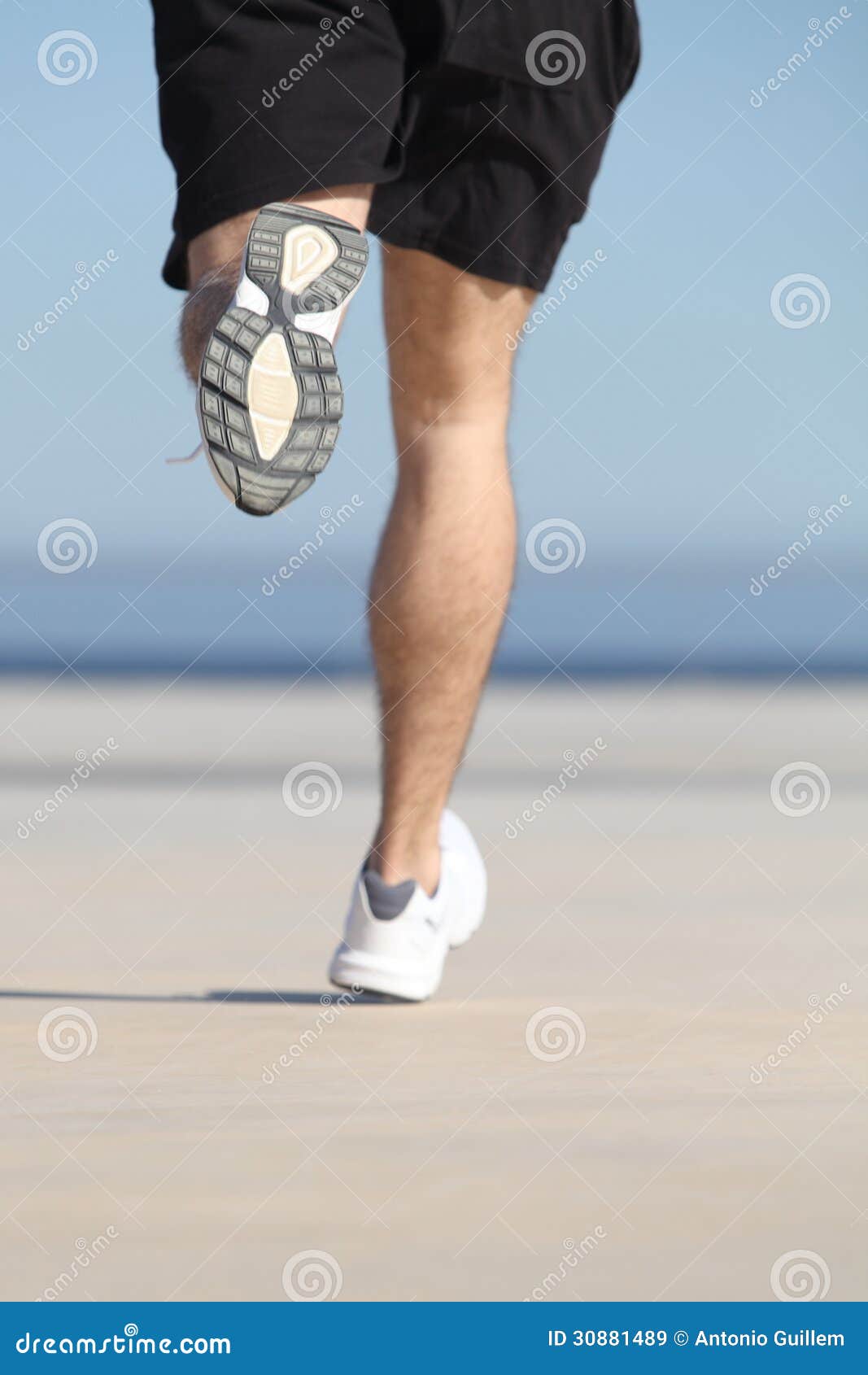 Unfocused Man Legs Running on the Concrete of a Seafront Stock Image ...
