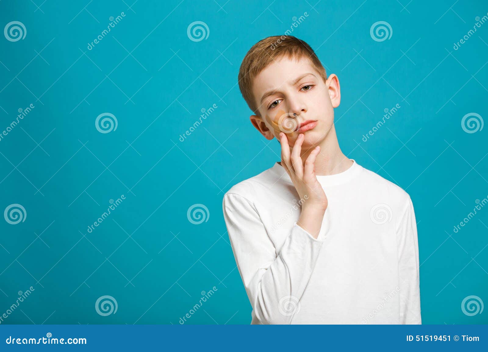 Unhappy Boy with Adhesive Plaster on His Cheek Stock Image - Image of ...