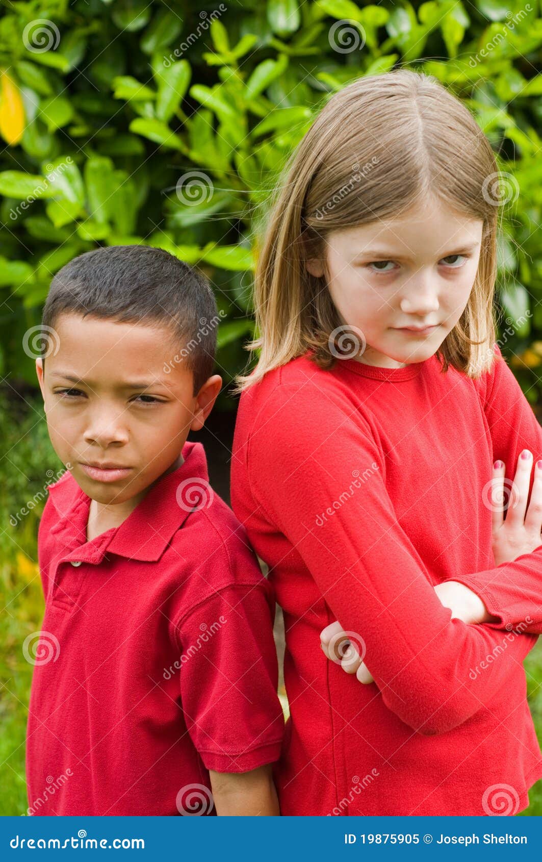 Unhappy boy and girl stock image. Image of kids, frown - 19875905