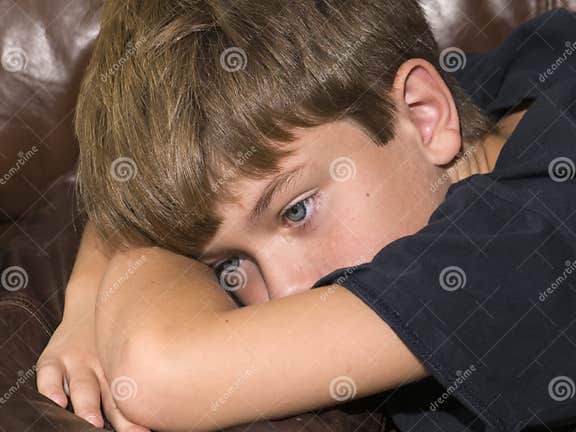 Unhappy boy2 stock image. Image of portrait, young, face - 6525479