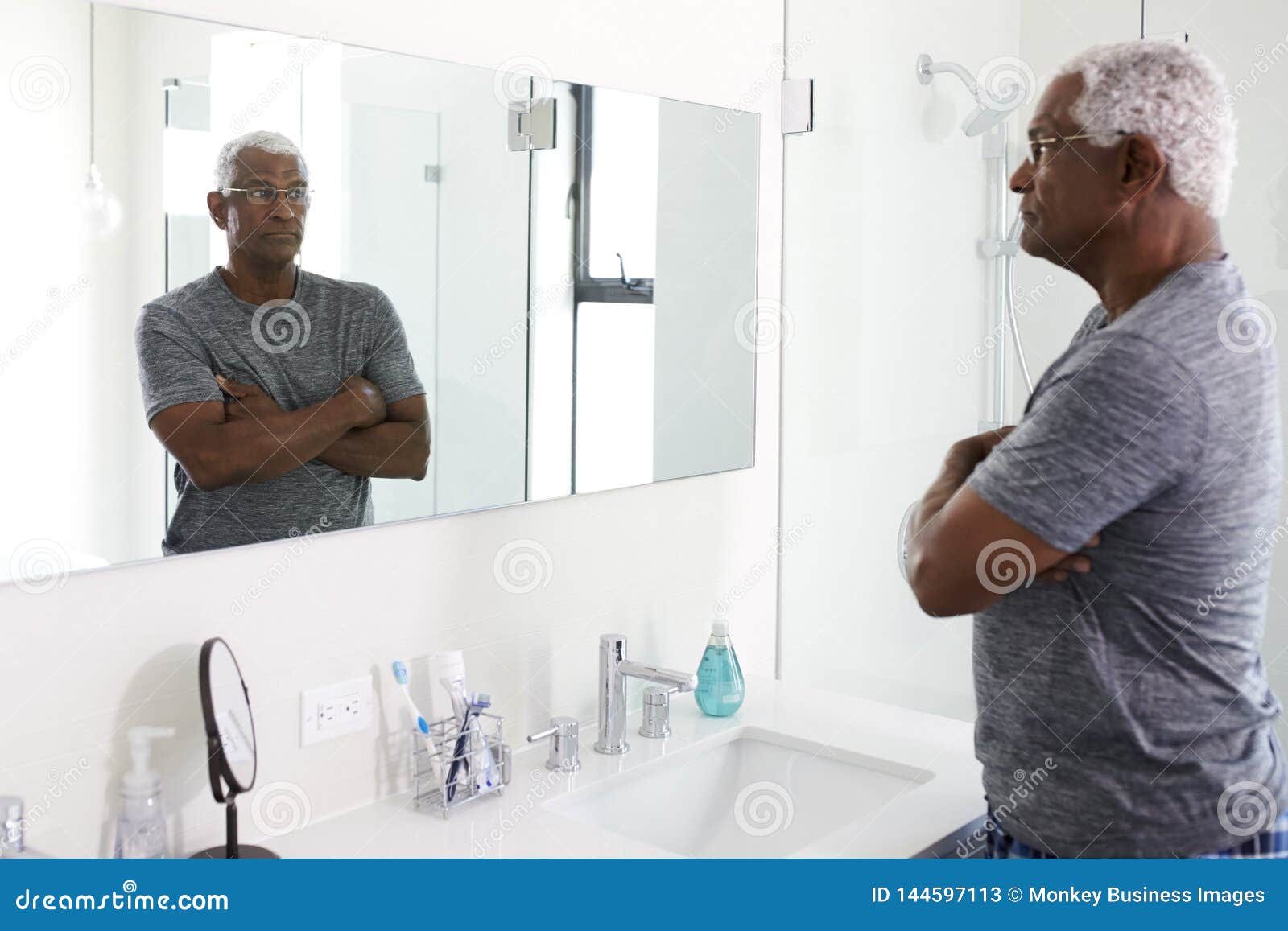 Unhappy Depressed Senior Man Looking at Reflection in Bathroom Mirror ...