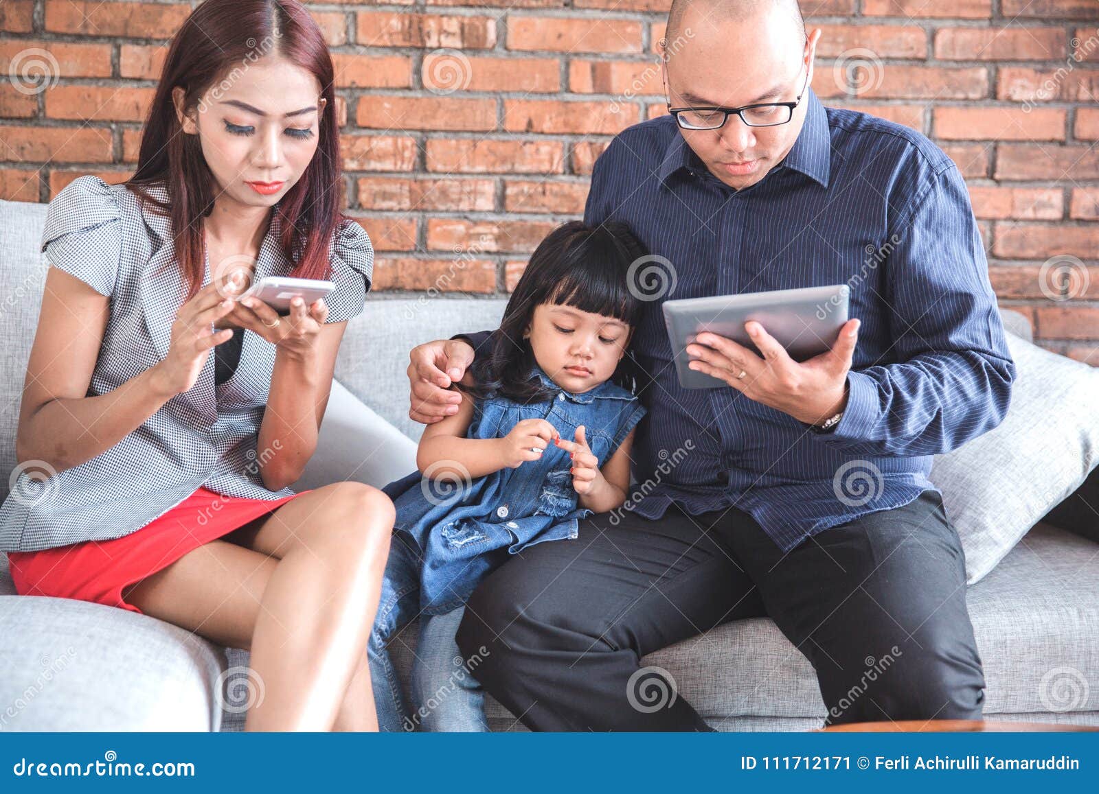 Busy Parenting Using Gadget Stock Image - Image of house, father: 111712171