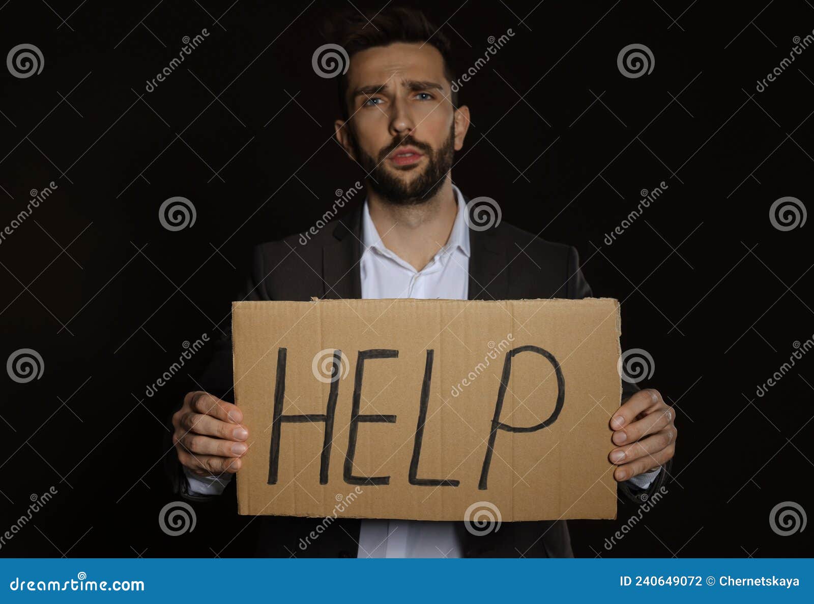 Unhappy Man with HELP Sign on Dark Background Stock Photo - Image of ...